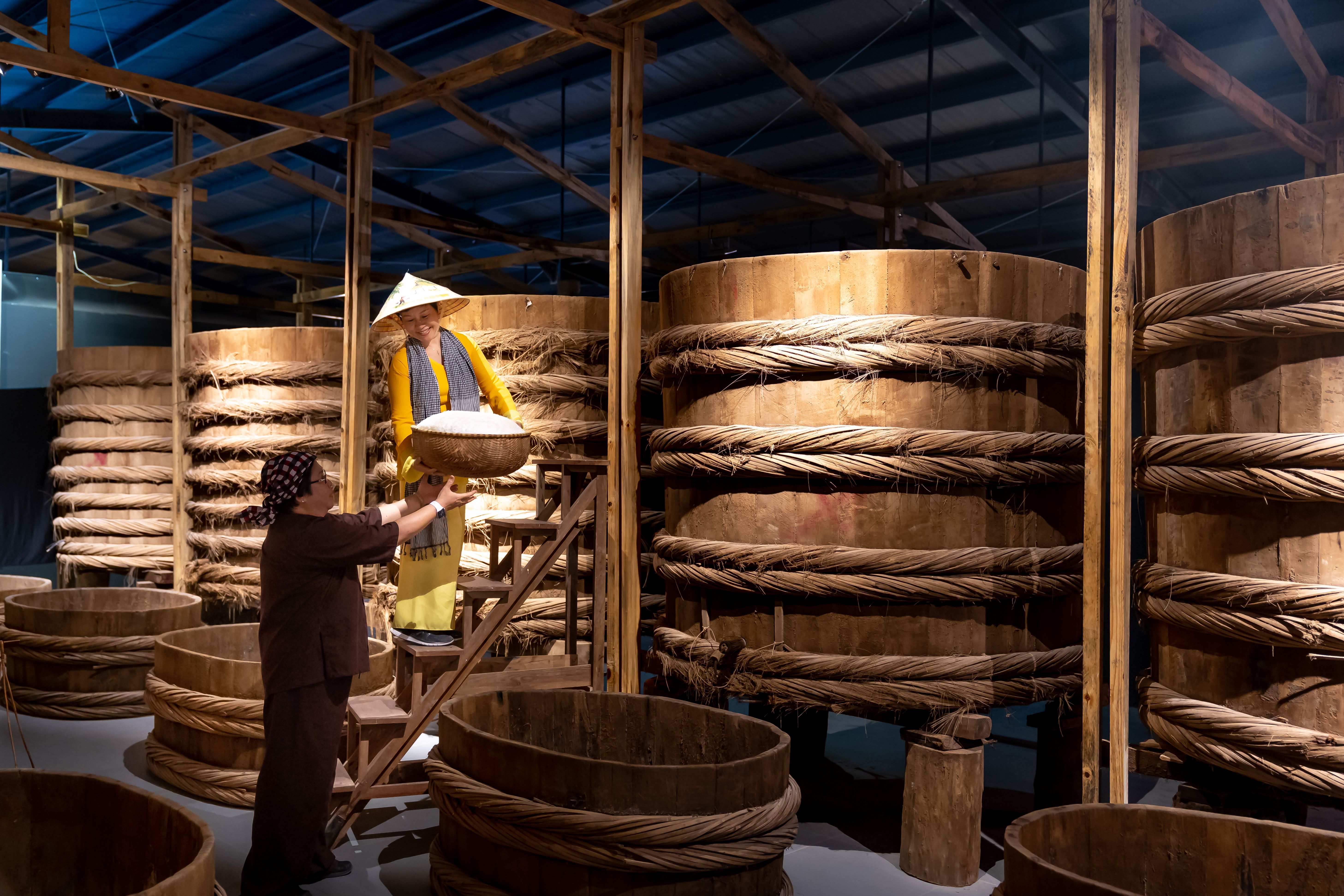 Chinese Woman Sieving Grain · Free Stock Photo