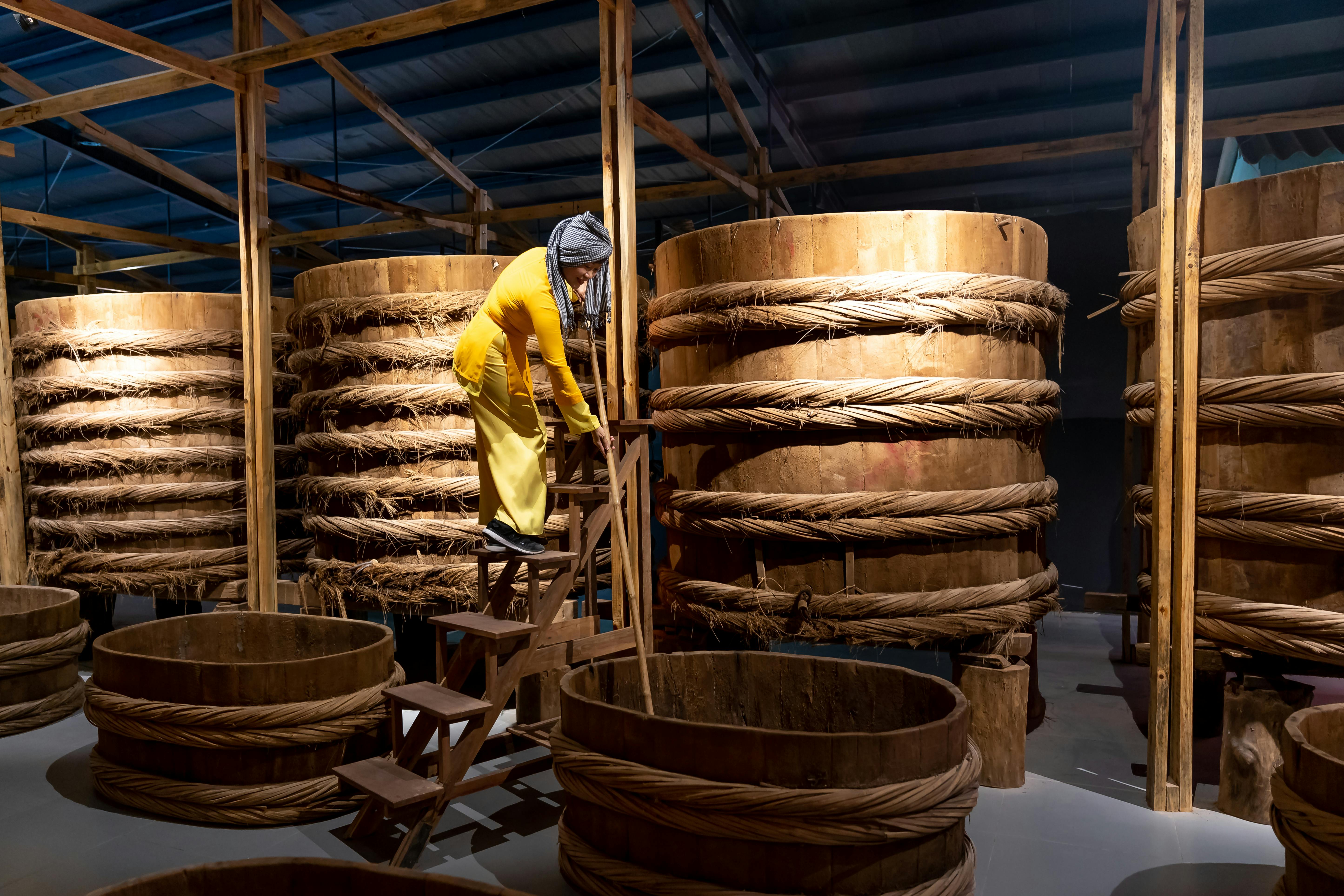 Woman Working with Barrels · Free Stock Photo