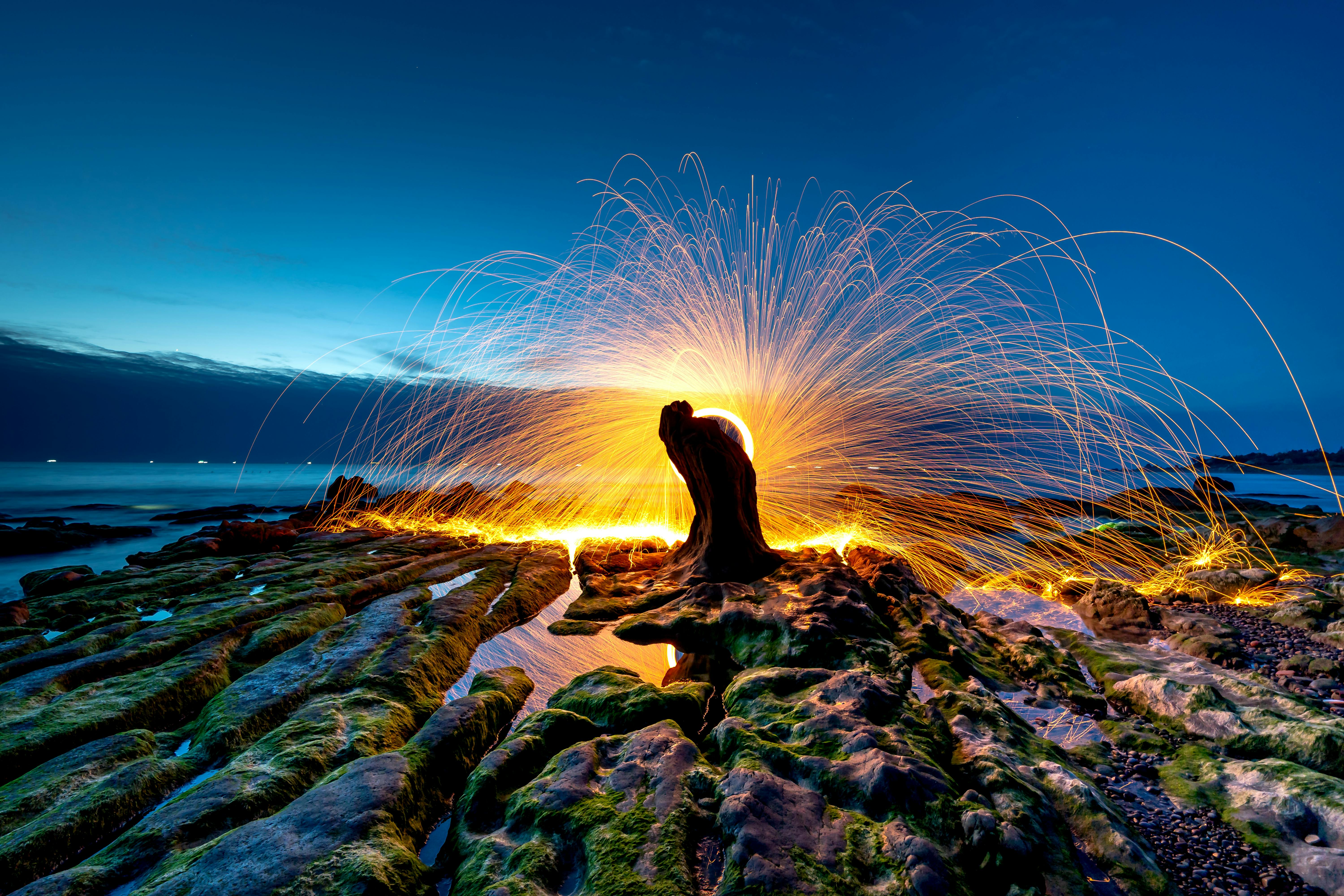 Pyrokinesis Show on a Seashore · Free Stock Photo