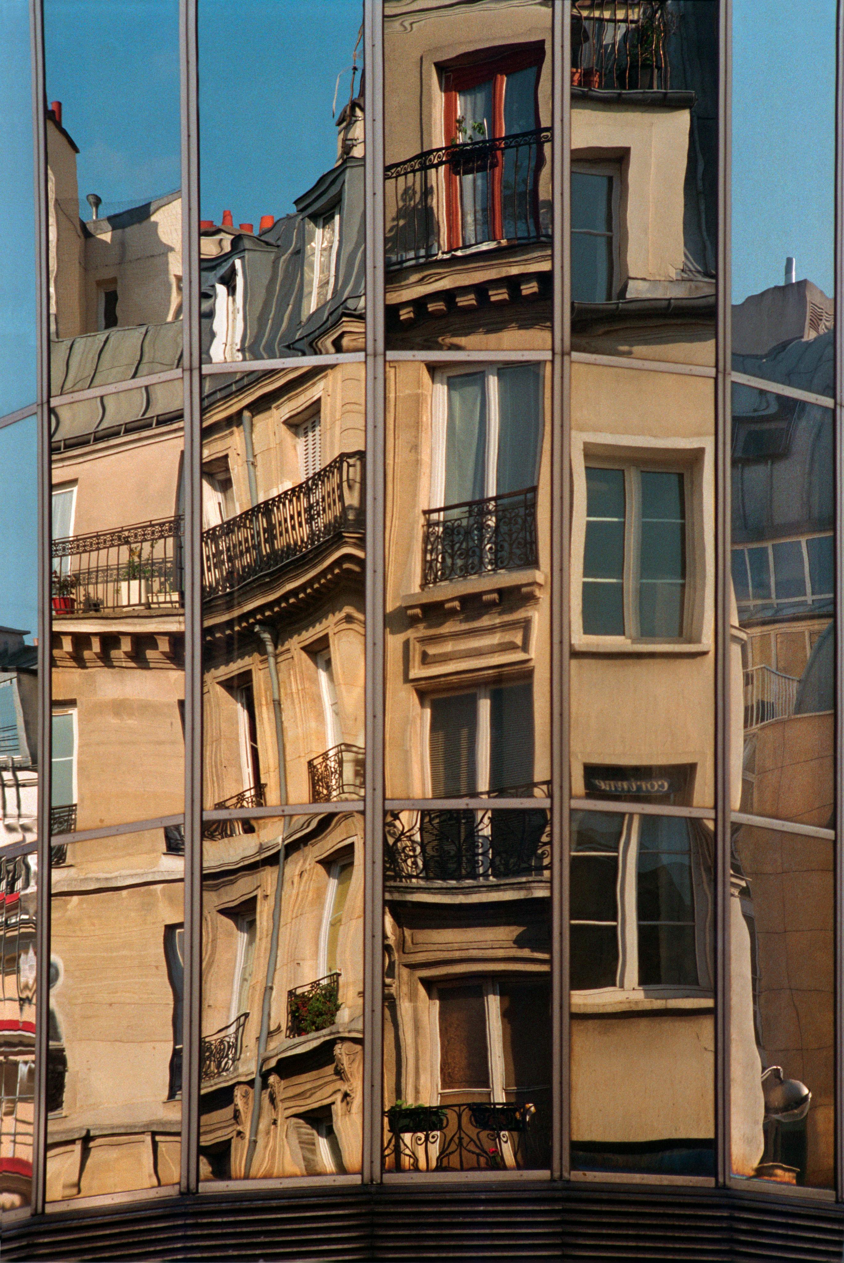 Building Reflection in Windows · Free Stock Photo