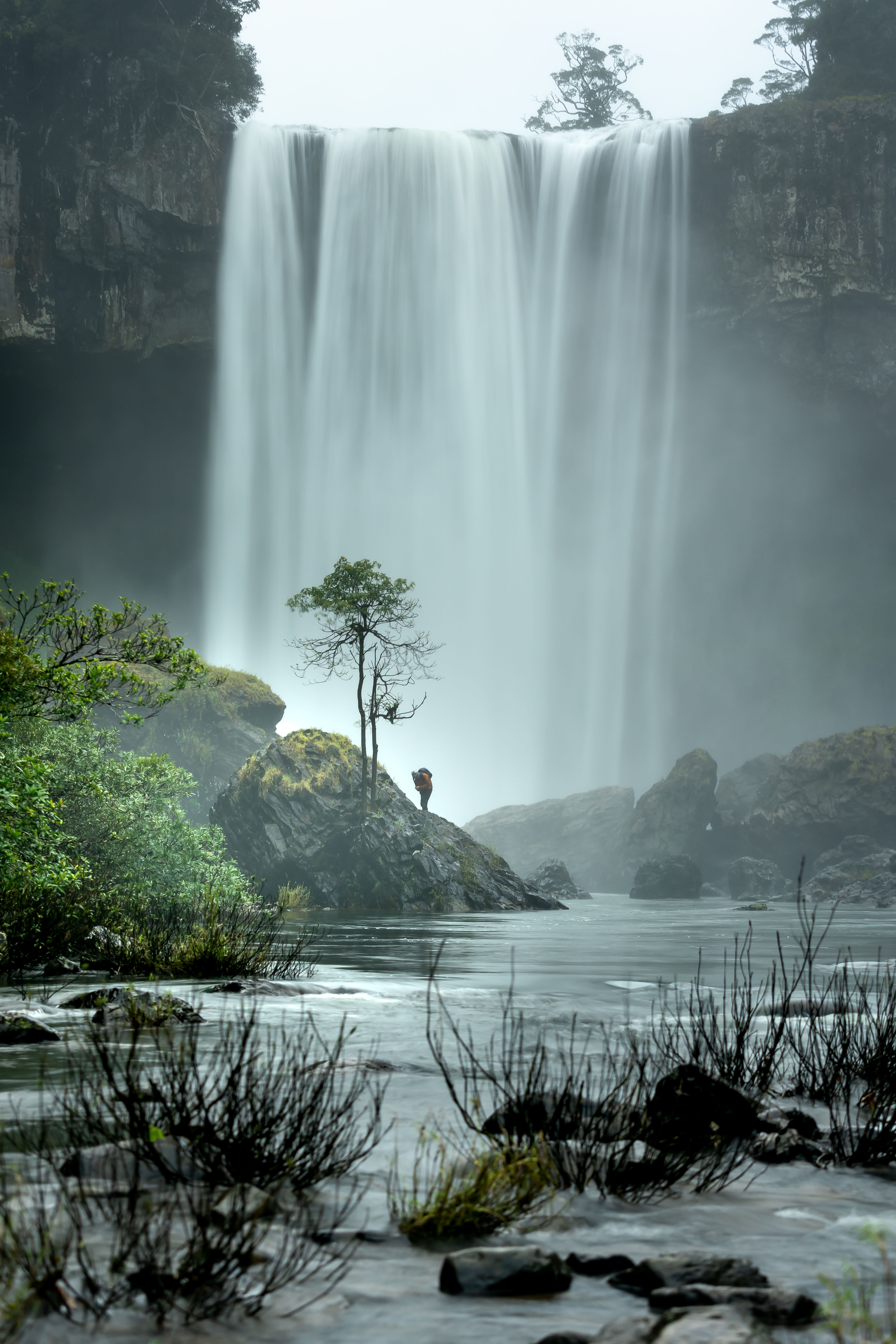 A Waterfall on a Rock Formation · Free Stock Photo