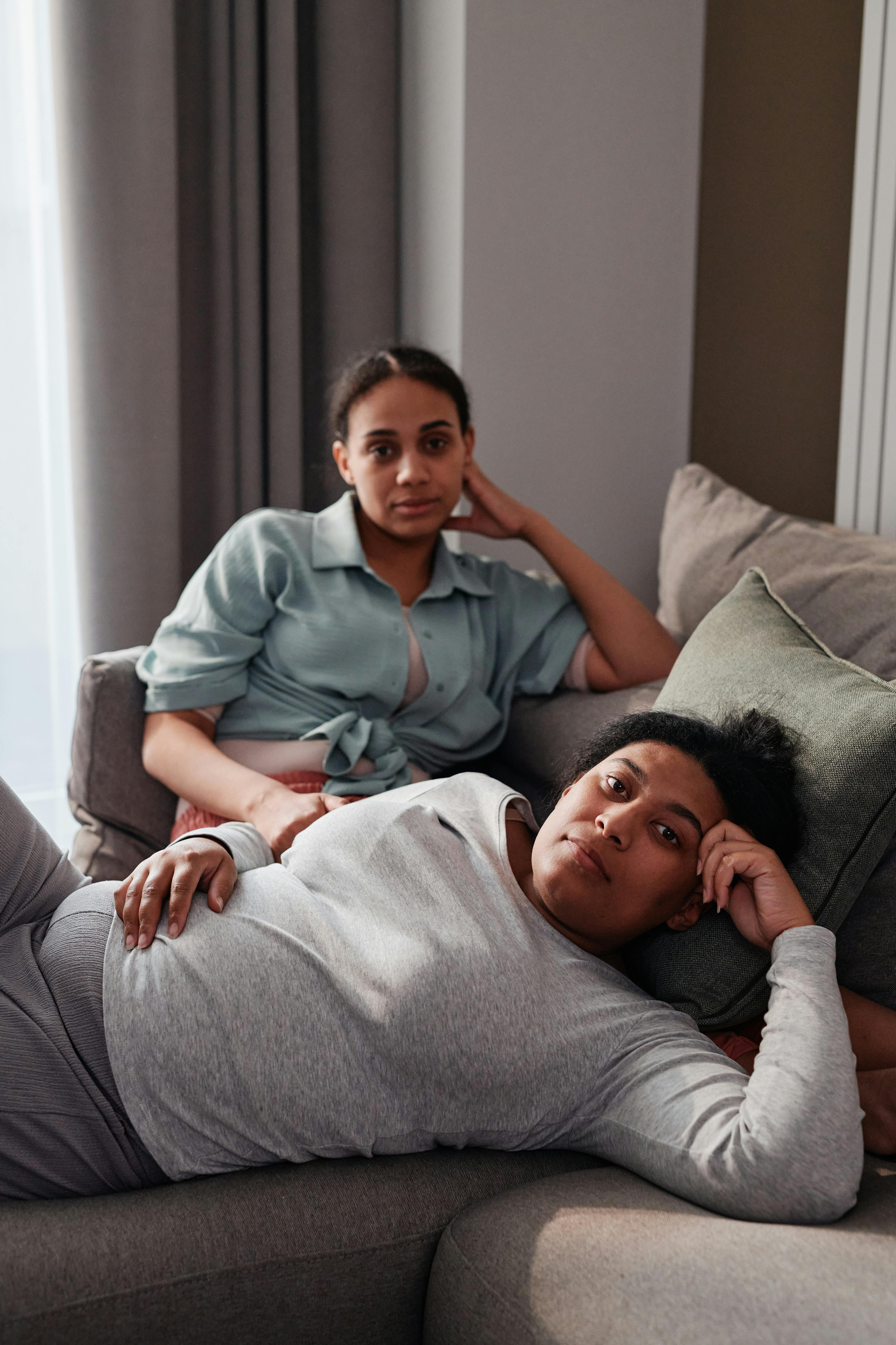 Women Posing on the Sofa · Free Stock Photo