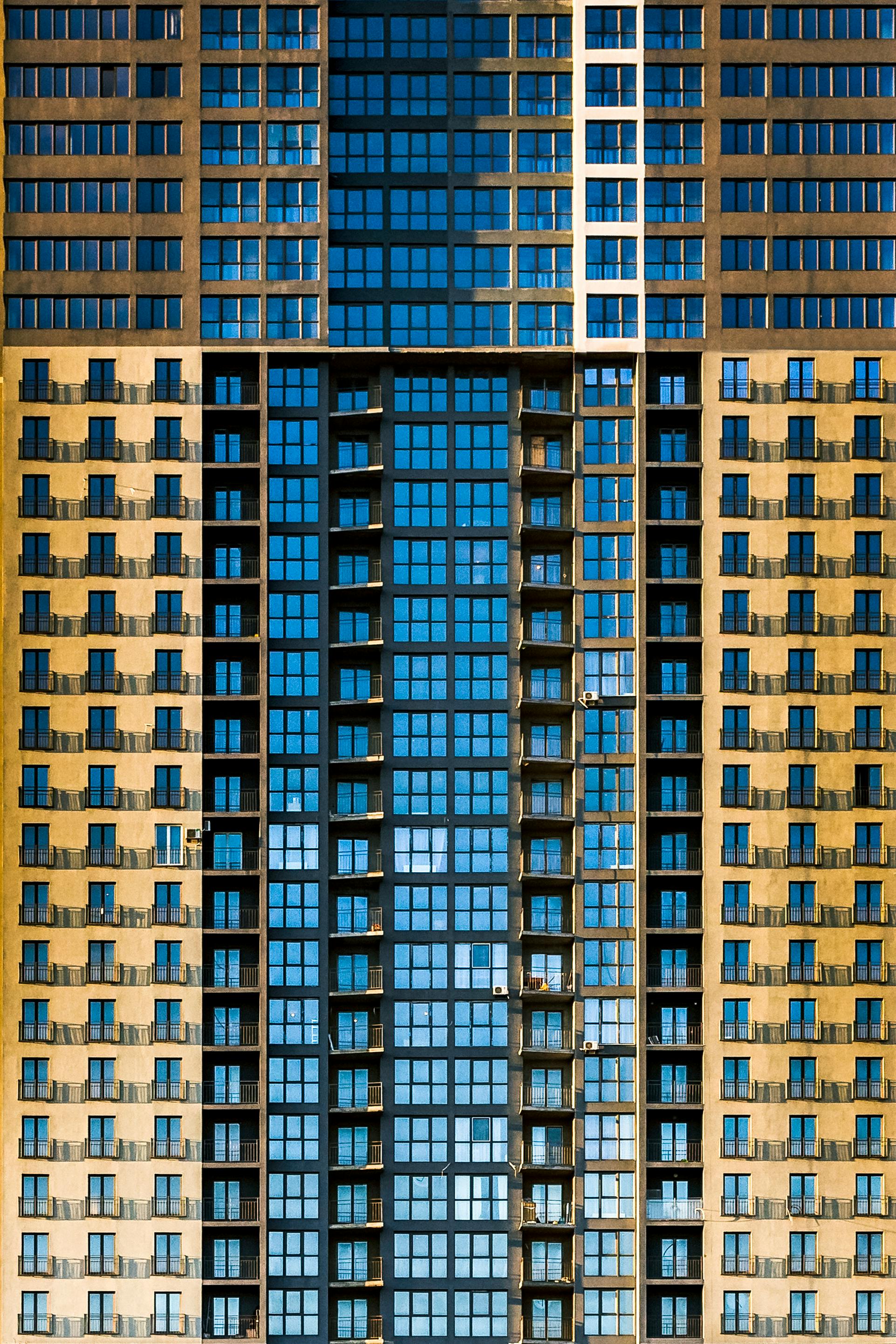 A Building with Glass Windows · Free Stock Photo