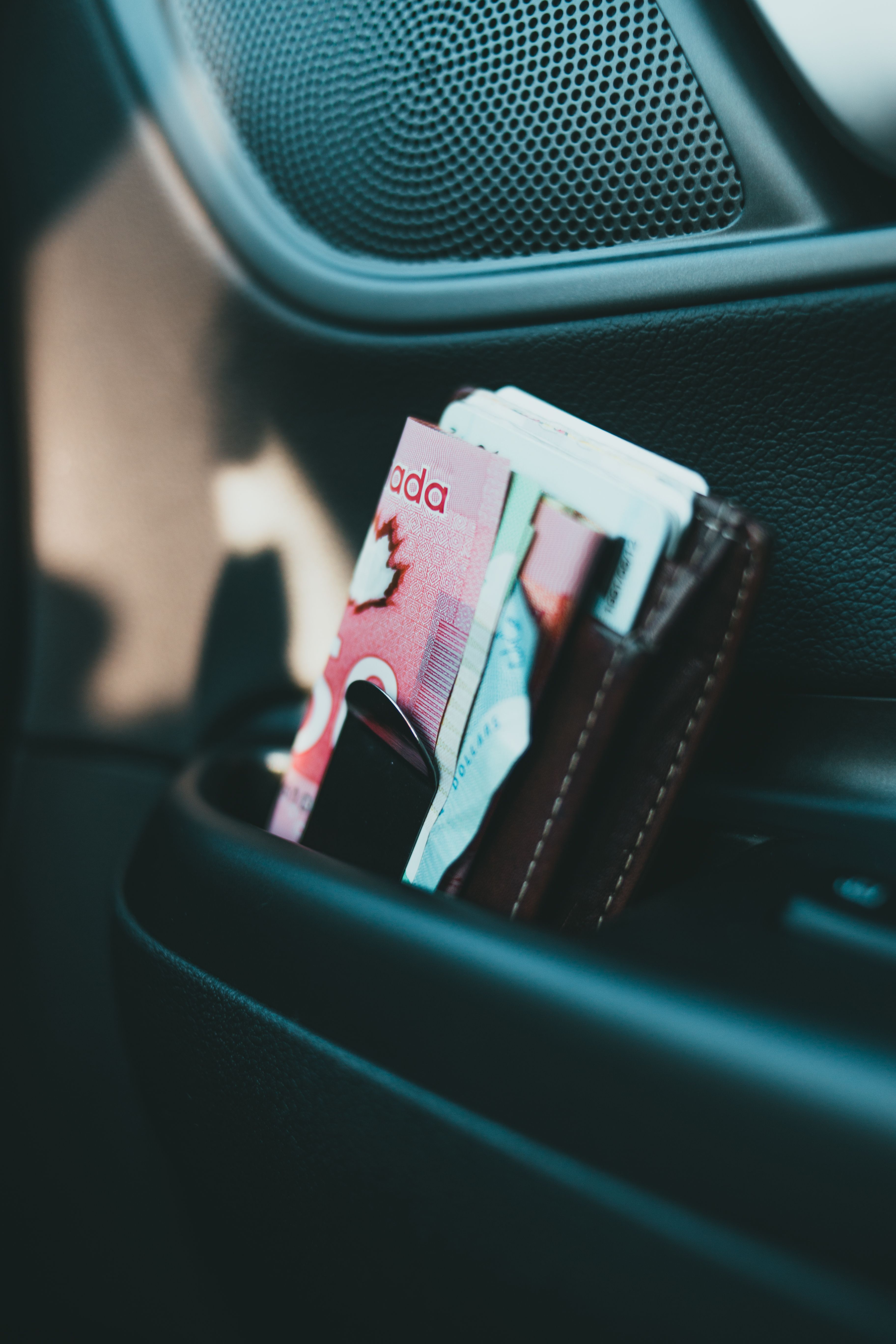 Cash Clipped on a Wallet · Free Stock Photo