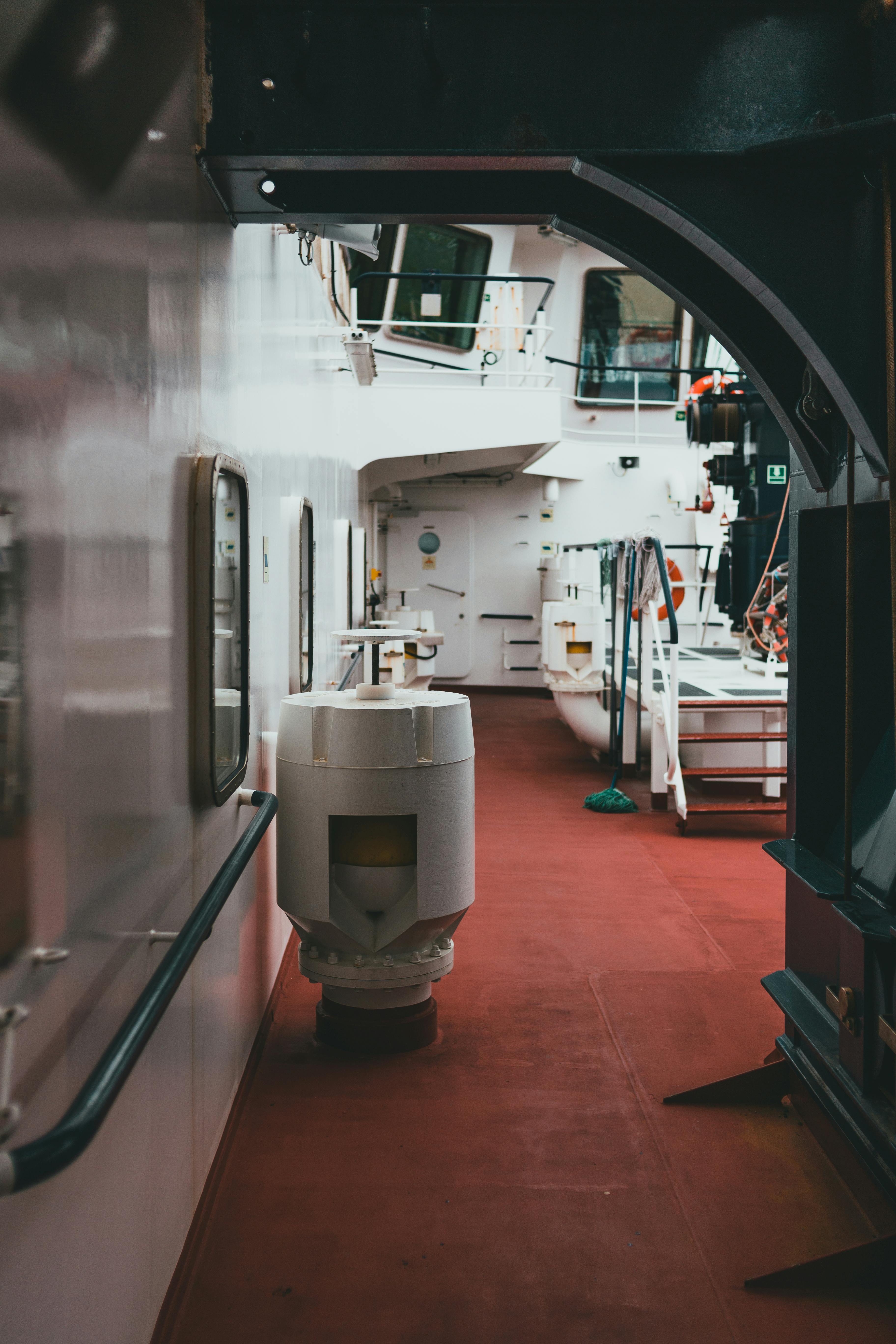 Photo of a Interior of a Ship with Benches · Free Stock Photo
