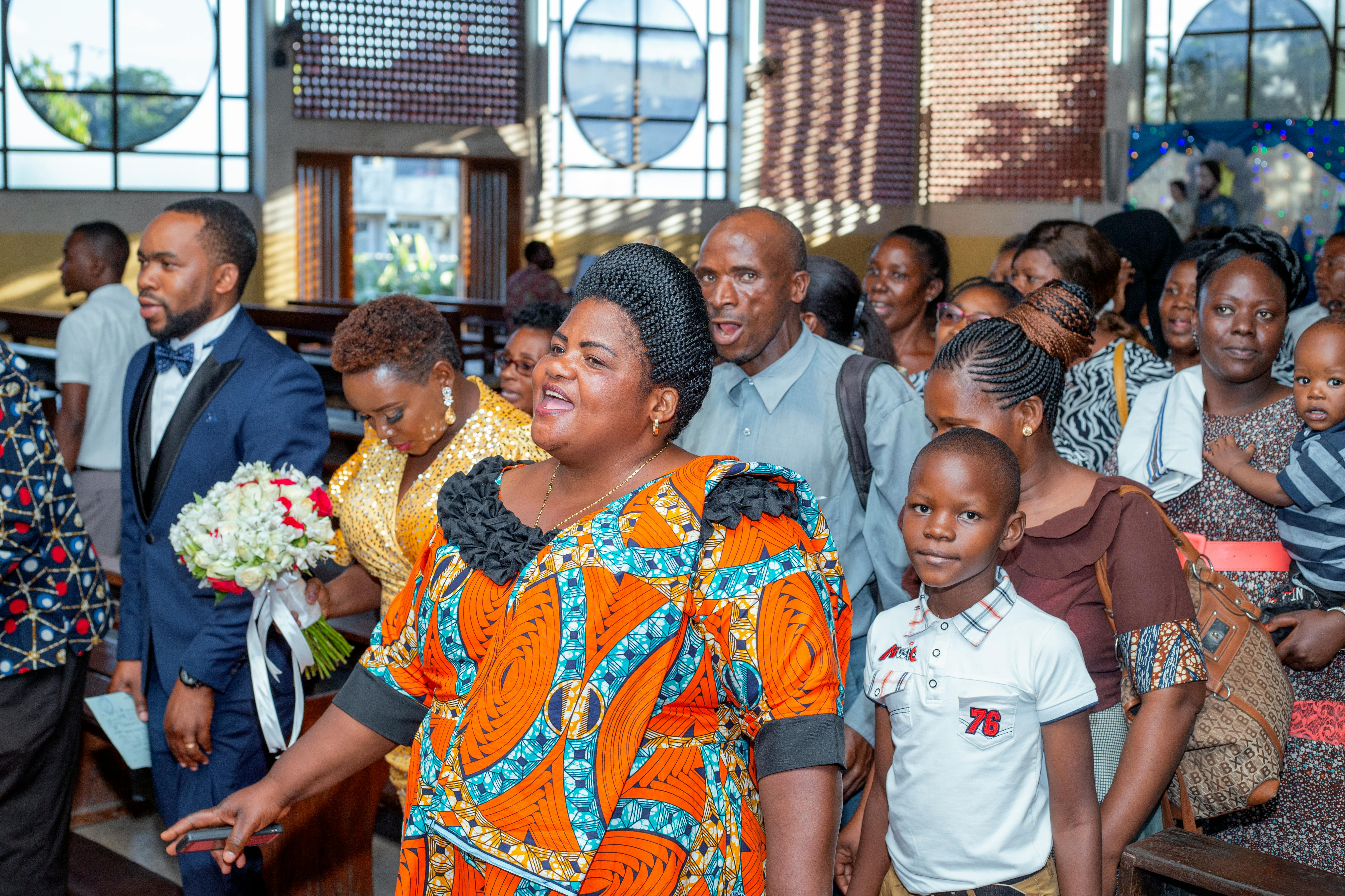 People Standing in the Church During a Ceremony · Free Stock Photo