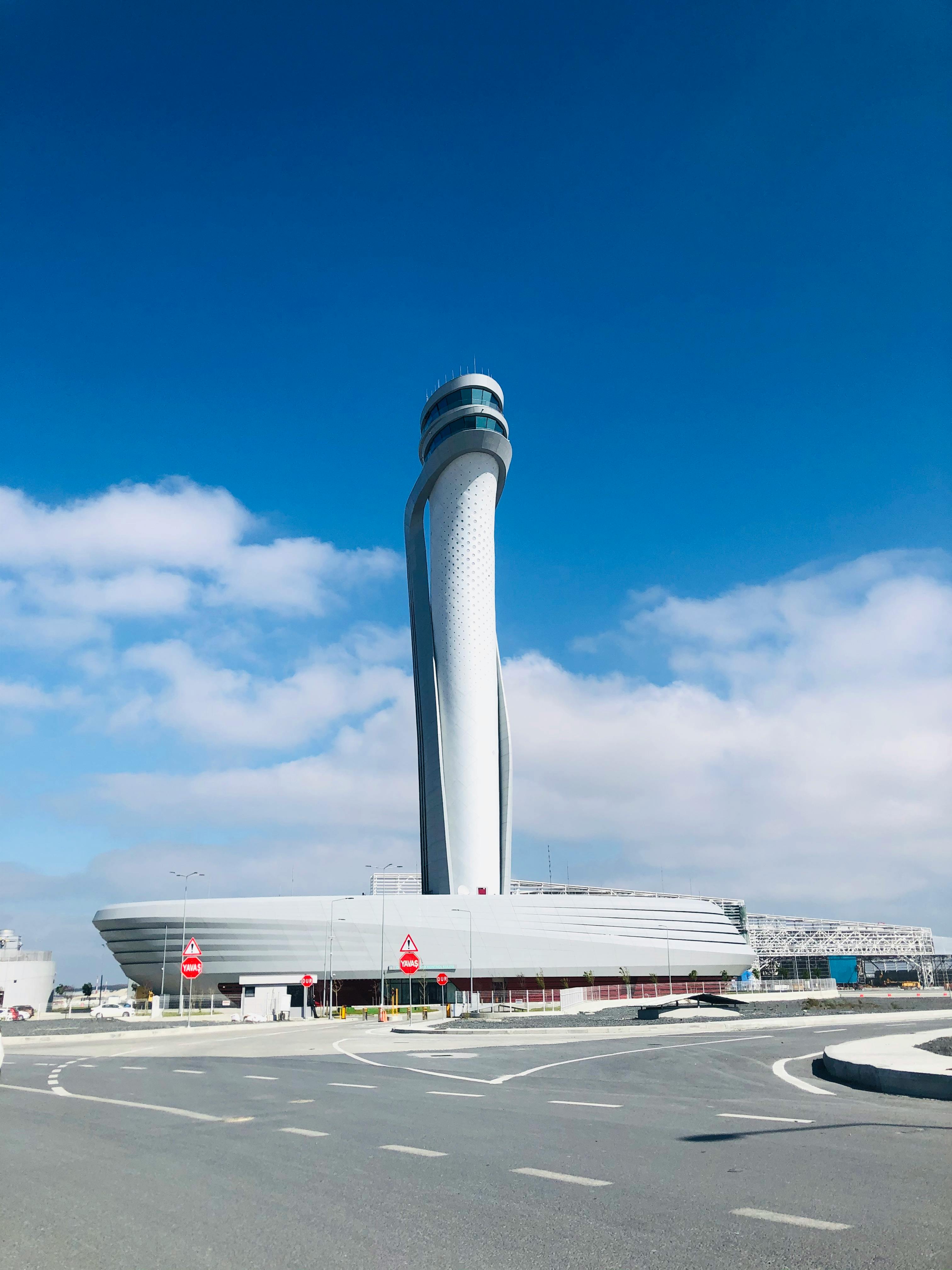 White Concrete Building Under the Blue Sky · Free Stock Photo