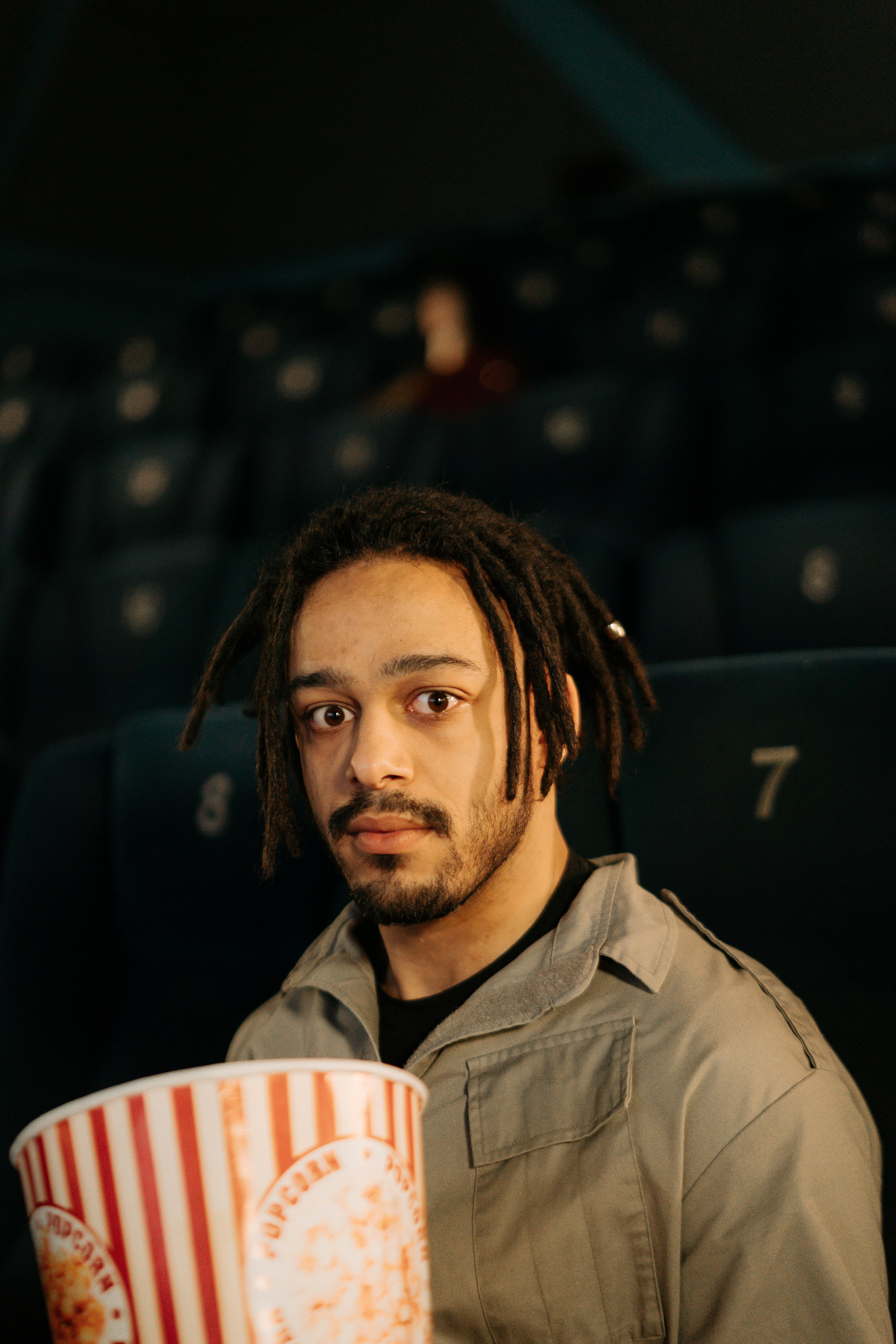 A Man in a Movie Theater · Free Stock Photo