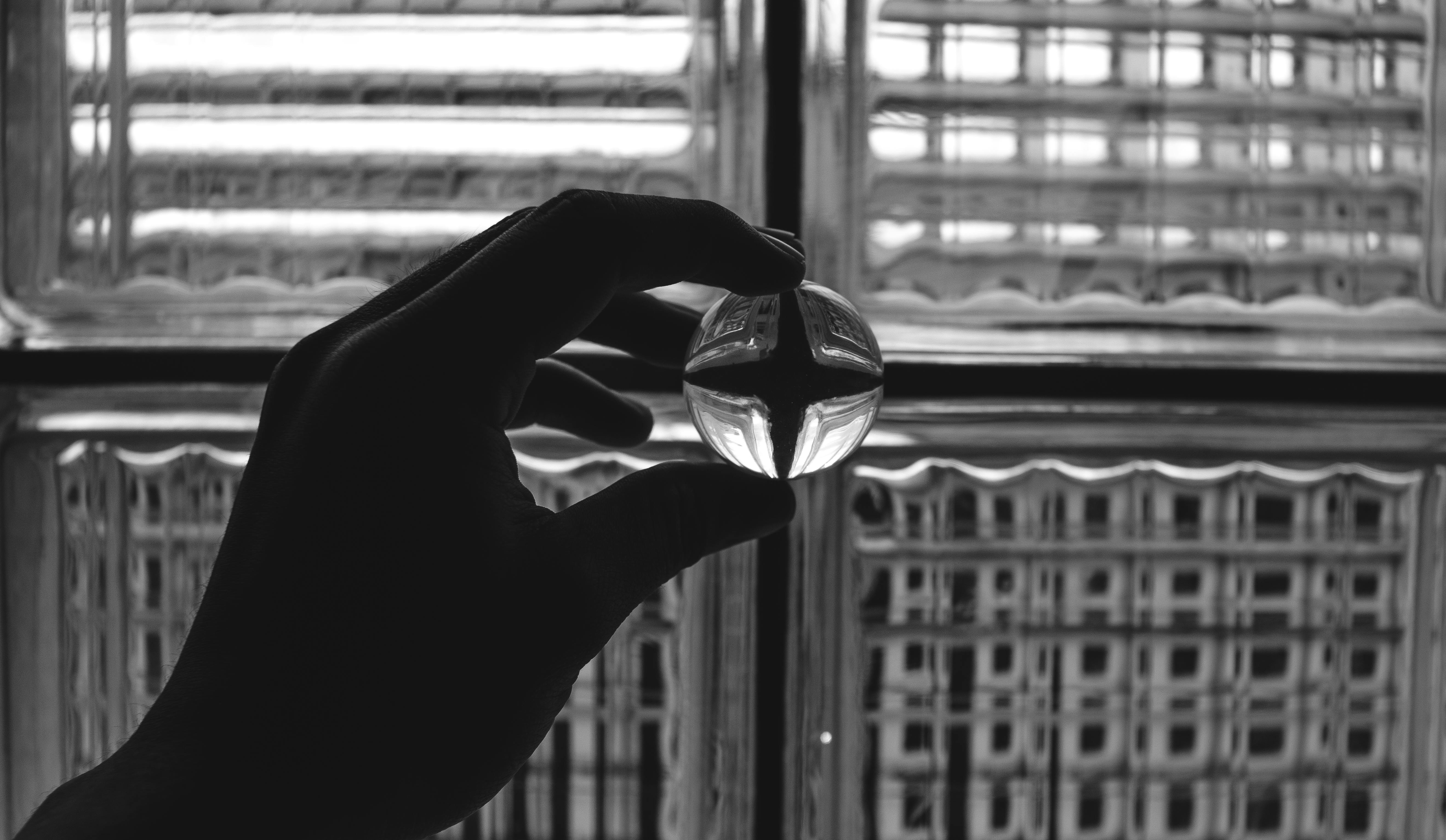 A Man Holding Round Objects to Juggle · Free Stock Photo