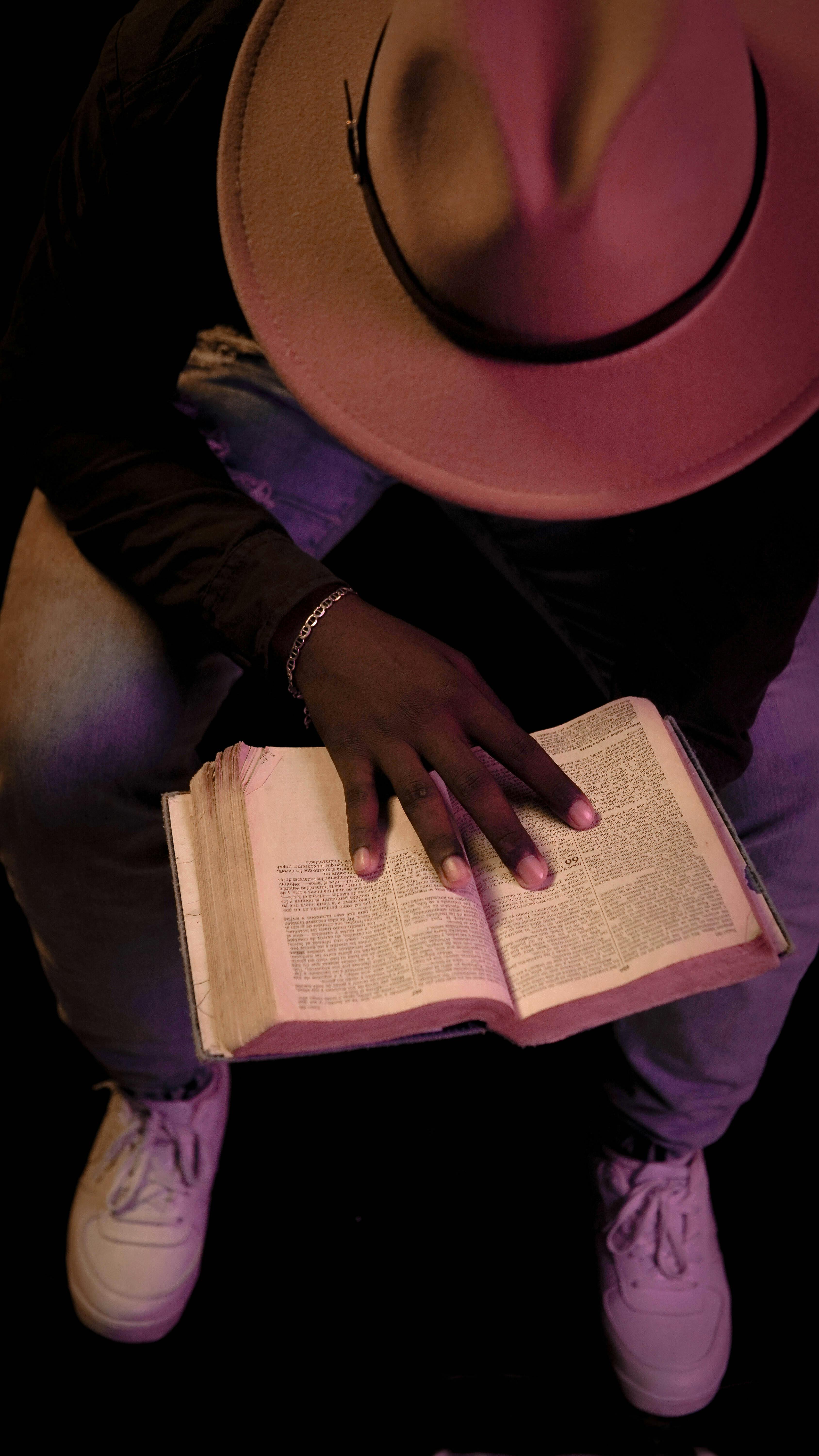 Man Touching Book · Free Stock Photo