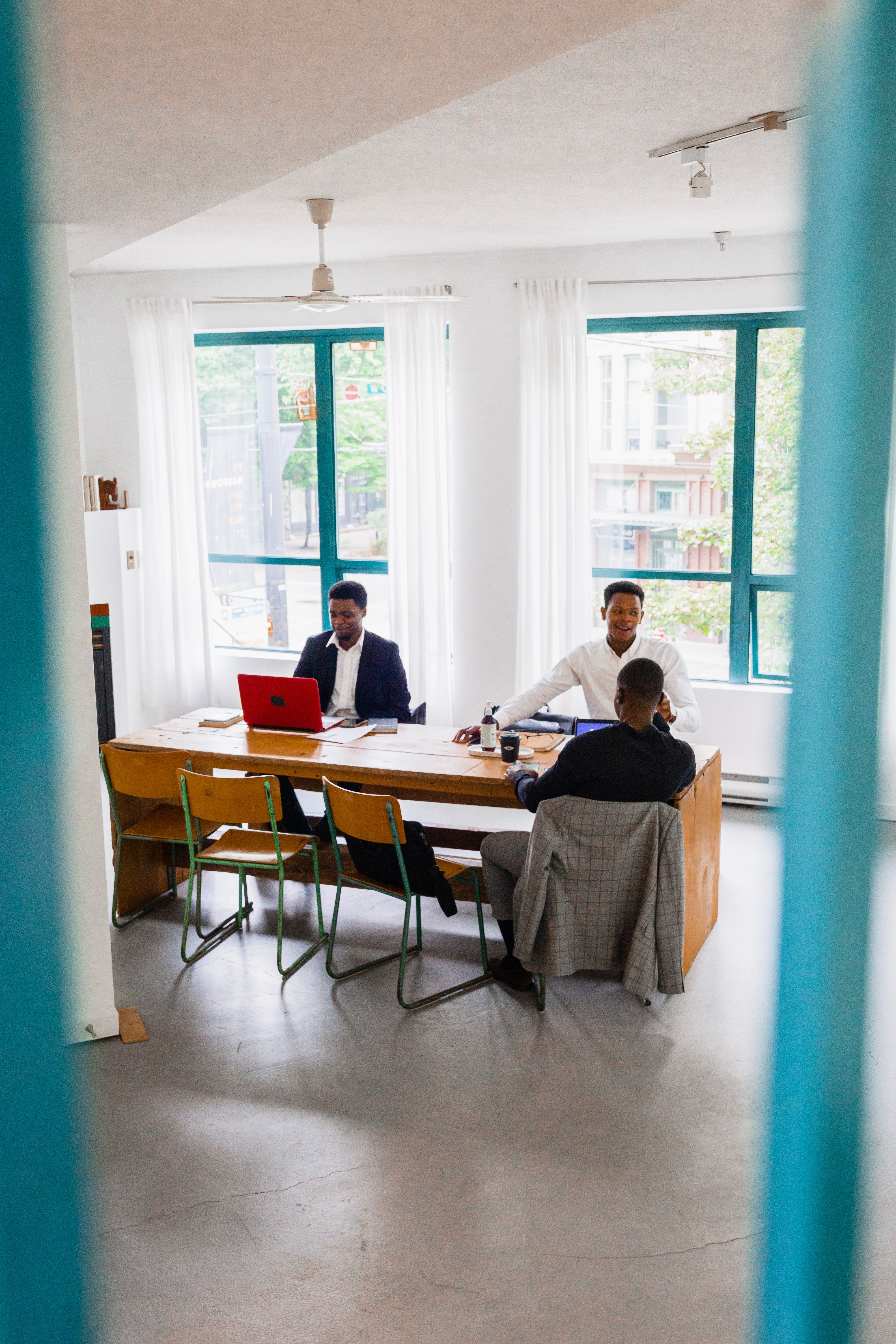 Men Having a Business Meeting at the Office · Free Stock Photo