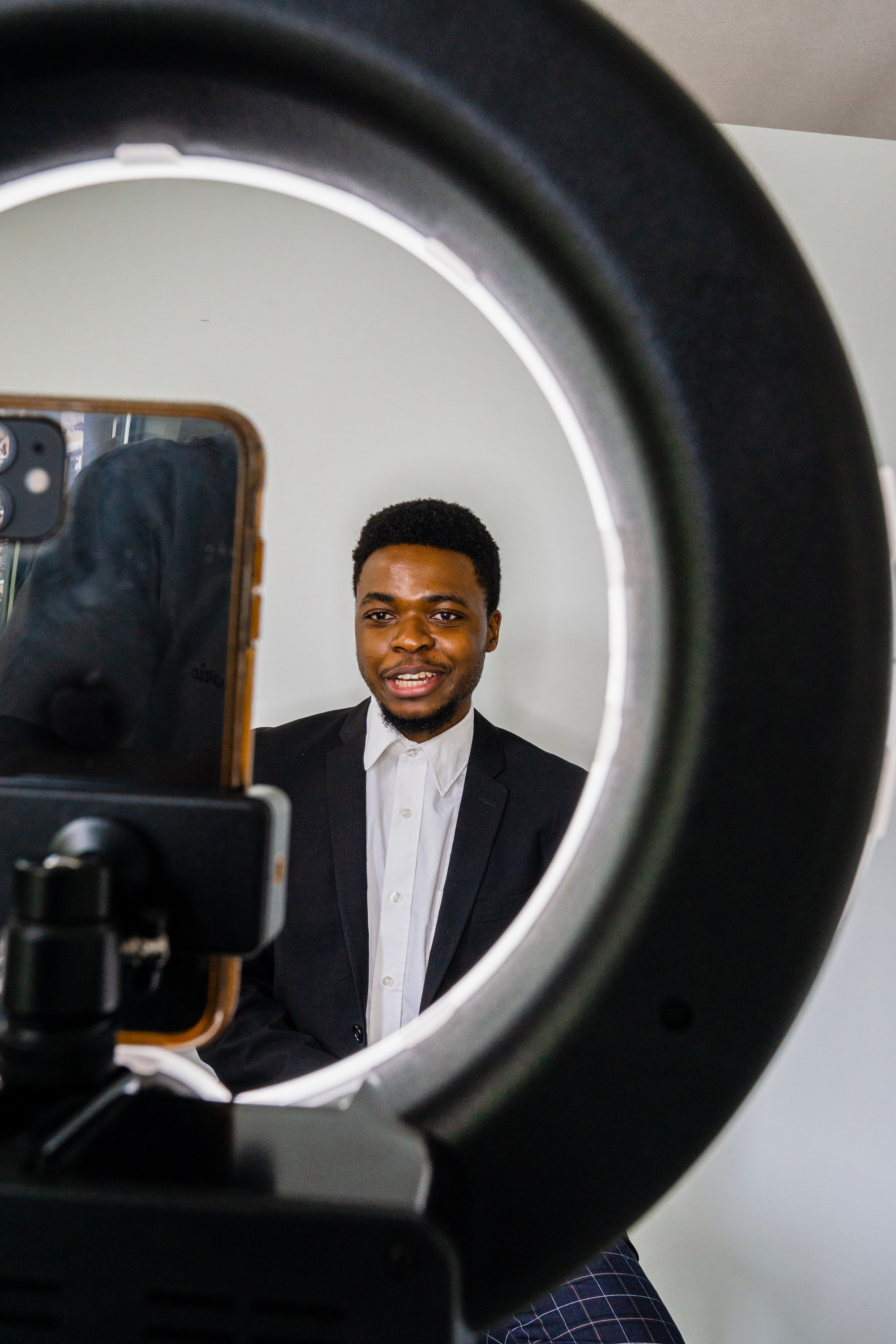 Man Recording a Video Using a Cellphone · Free Stock Photo