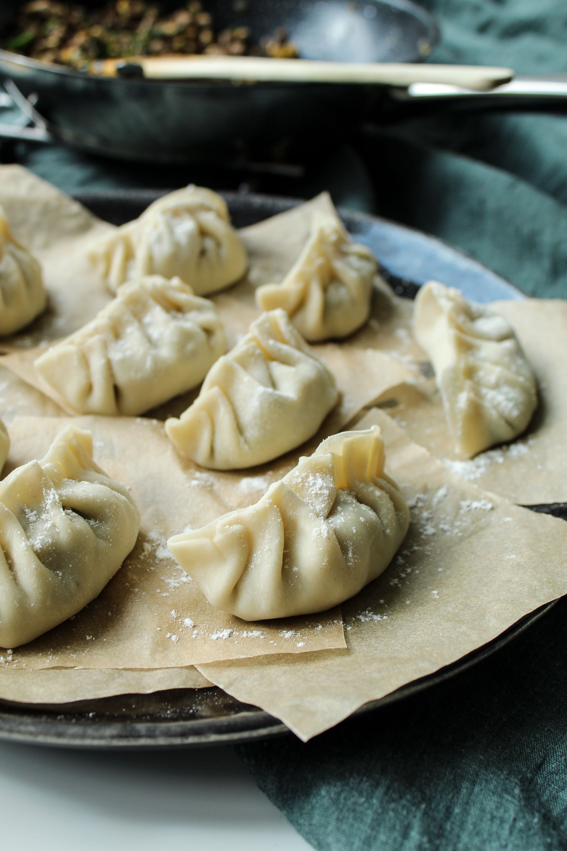 Close-Up Shot of Raw Dumplings on a Tray · Free Stock Photo