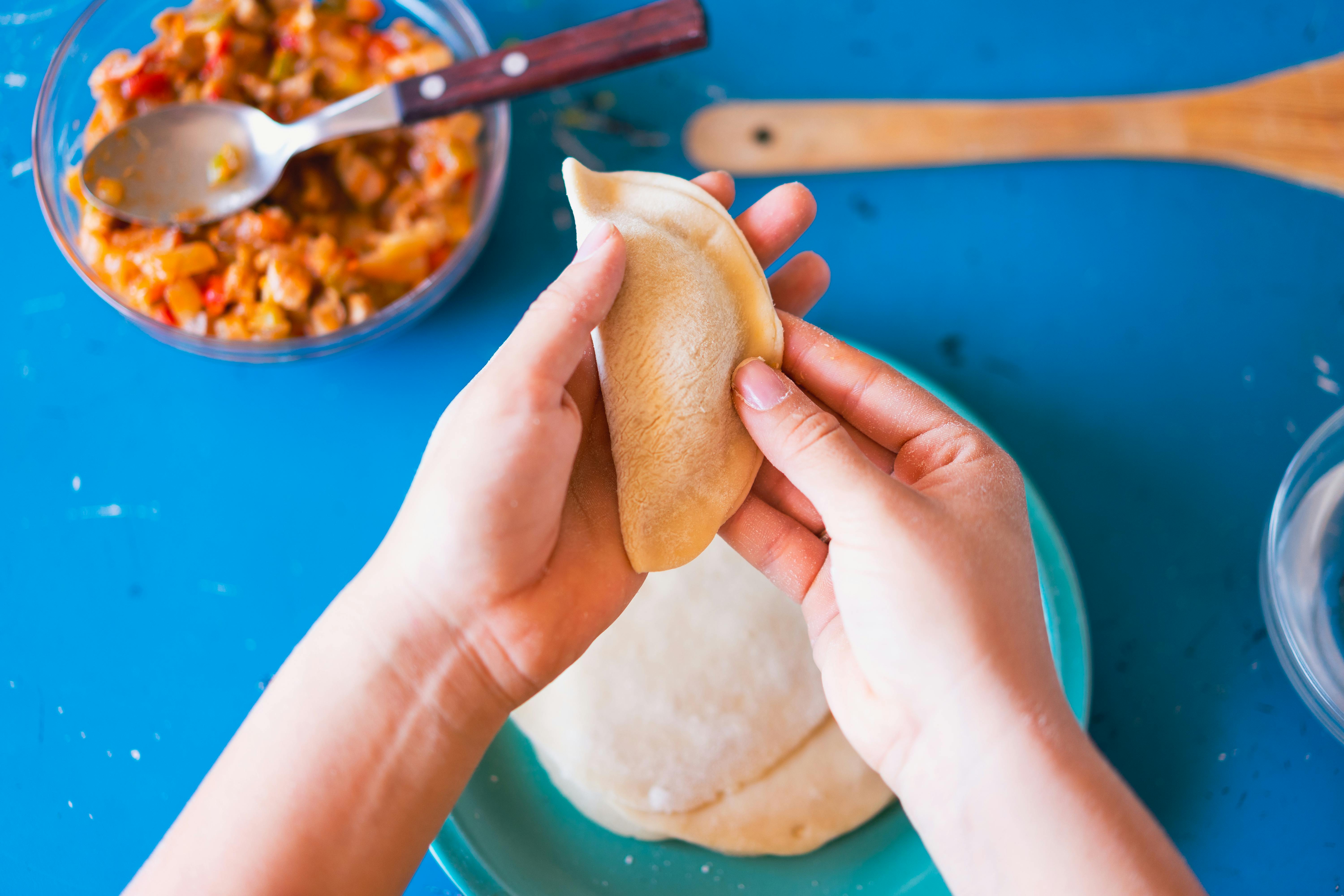 Person Making Brown Bread · Free Stock Photo