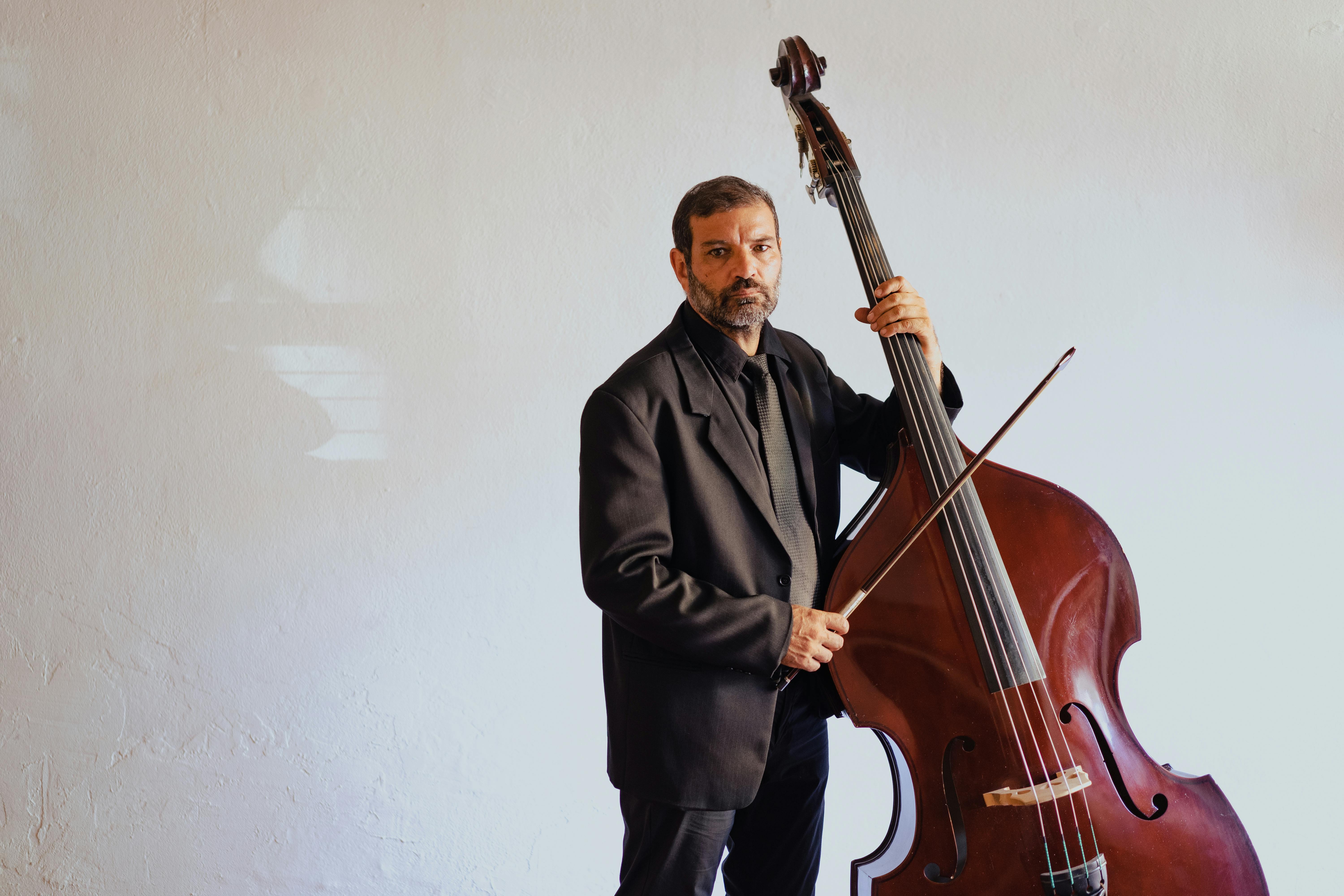Standing Cellist Photos, Download The BEST Free Standing Cellist Stock ...