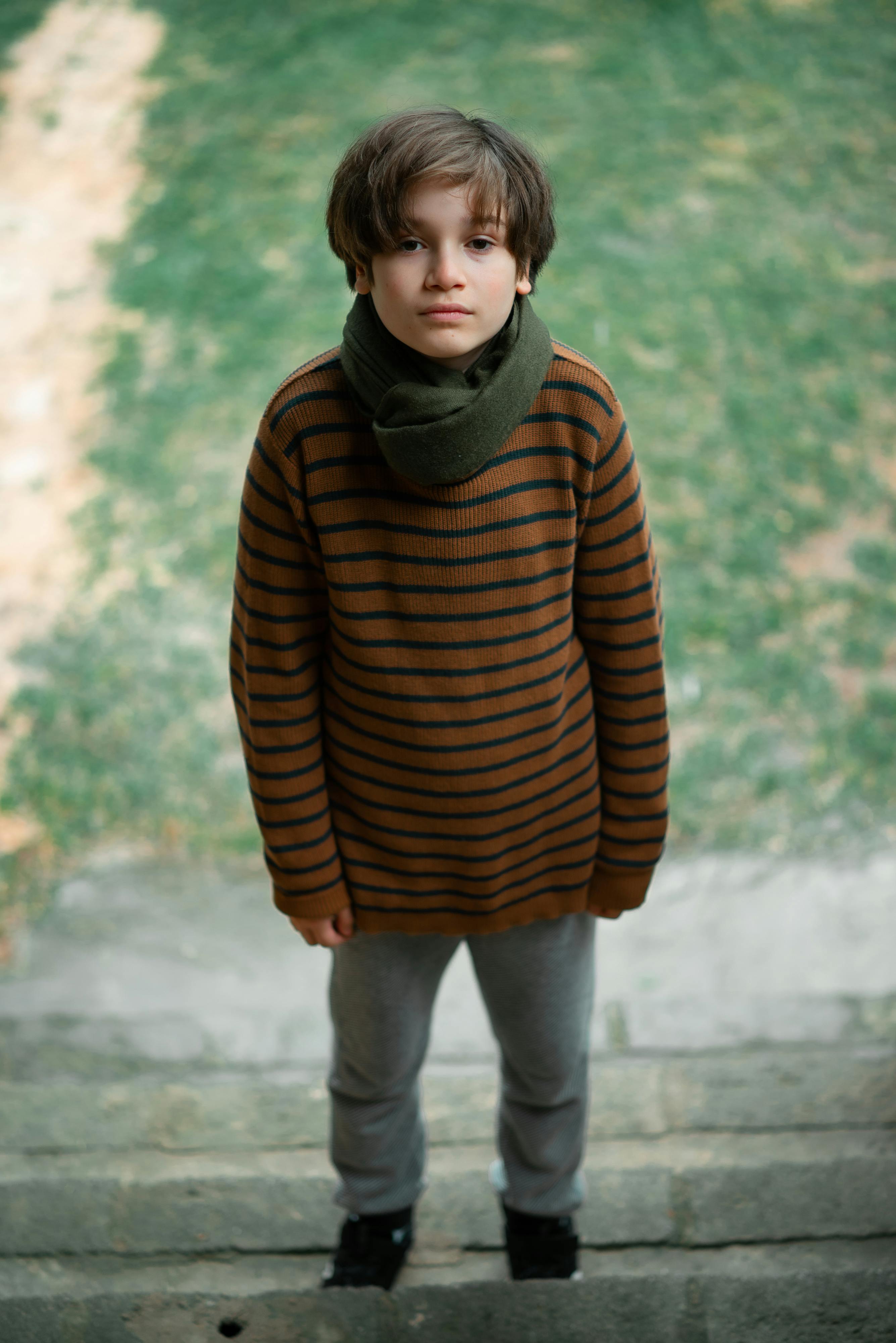 Boy Pumping Water · Free Stock Photo