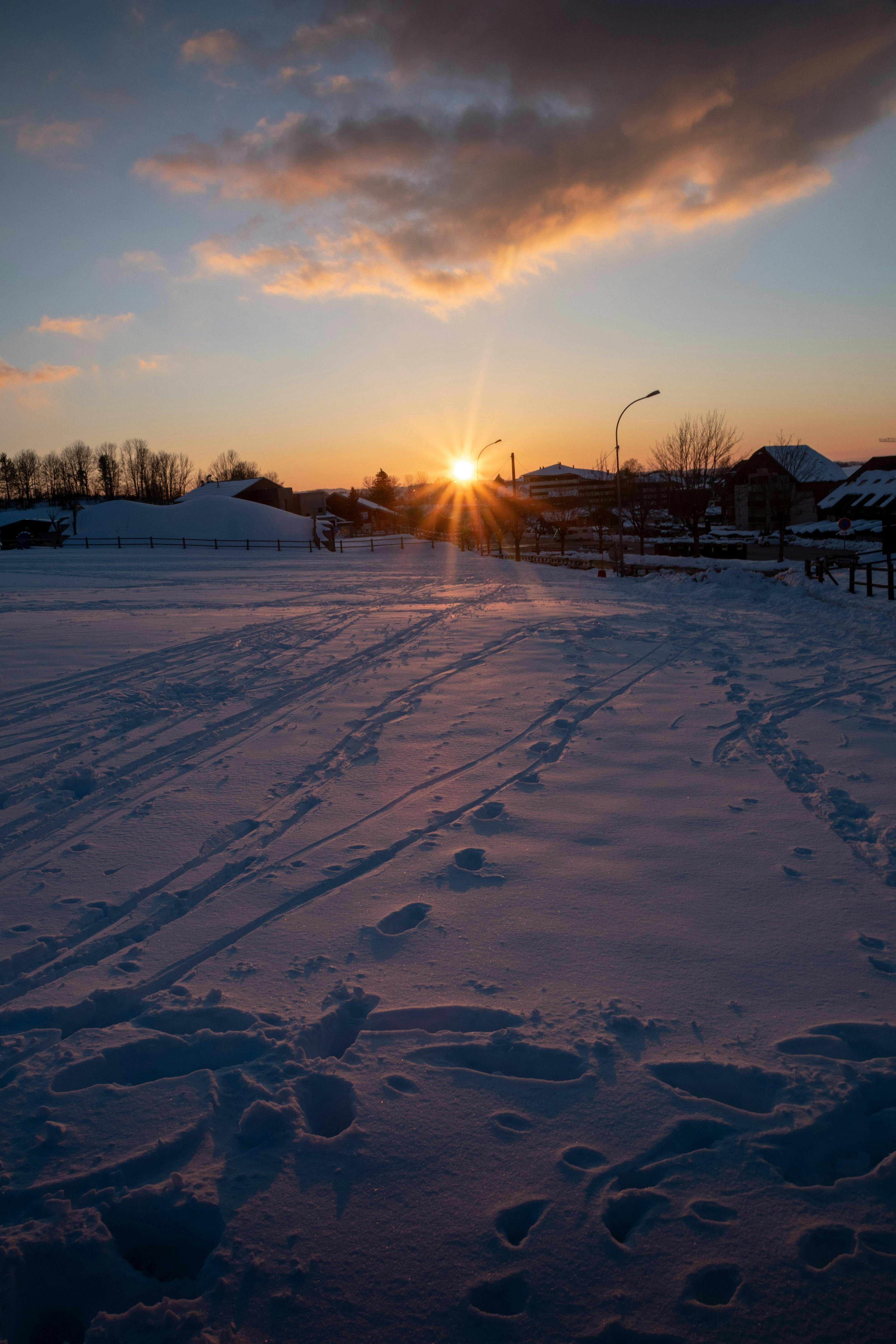 Snow Covered Field during Golden Hour · Free Stock Photo