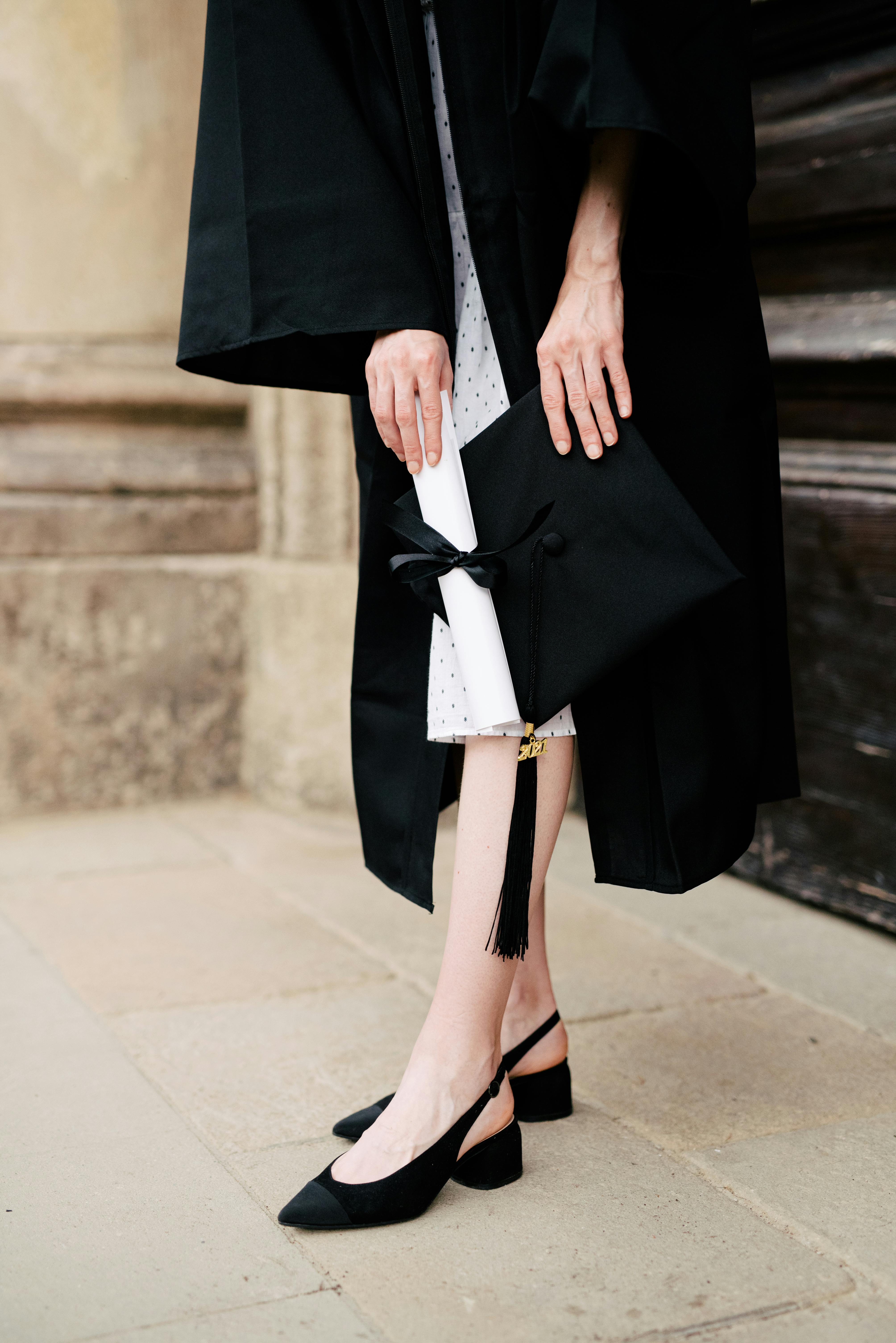 Woman in Black Academic Dress · Free Stock Photo