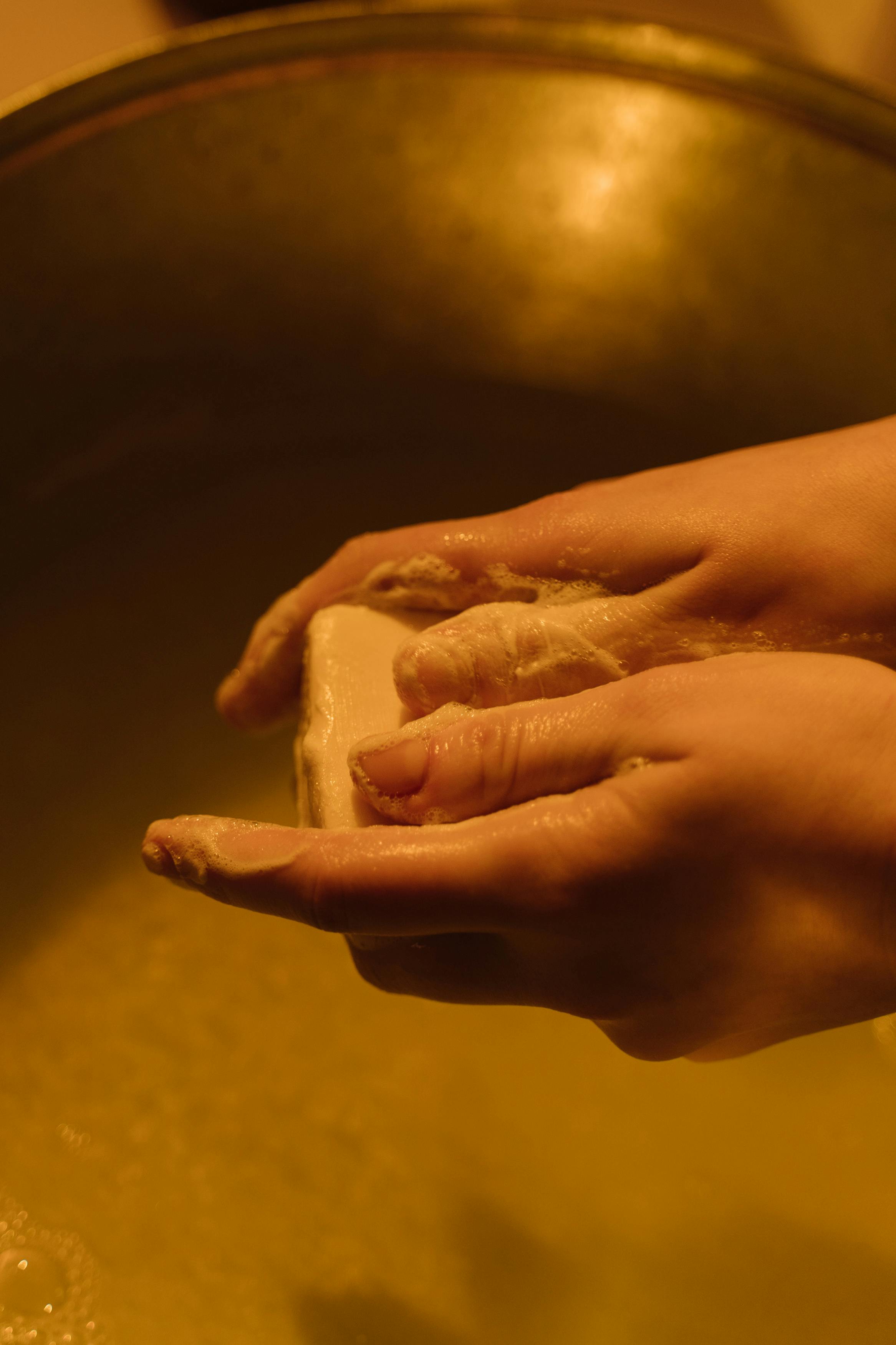 Close-Up Photo of a Person Using a Body Scrub · Free Stock Photo