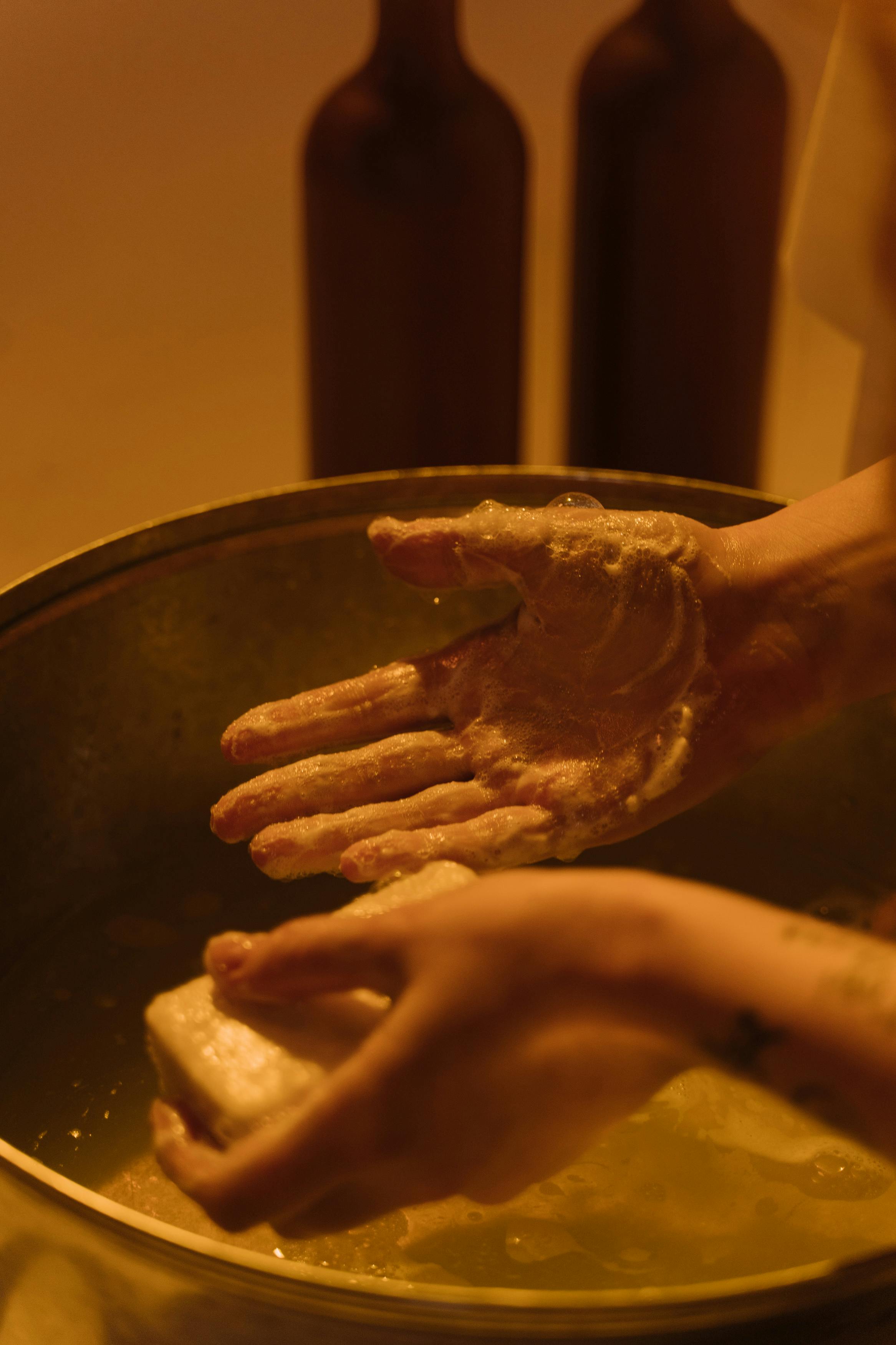 Close-Up Photo of a Person Using a Body Scrub · Free Stock Photo