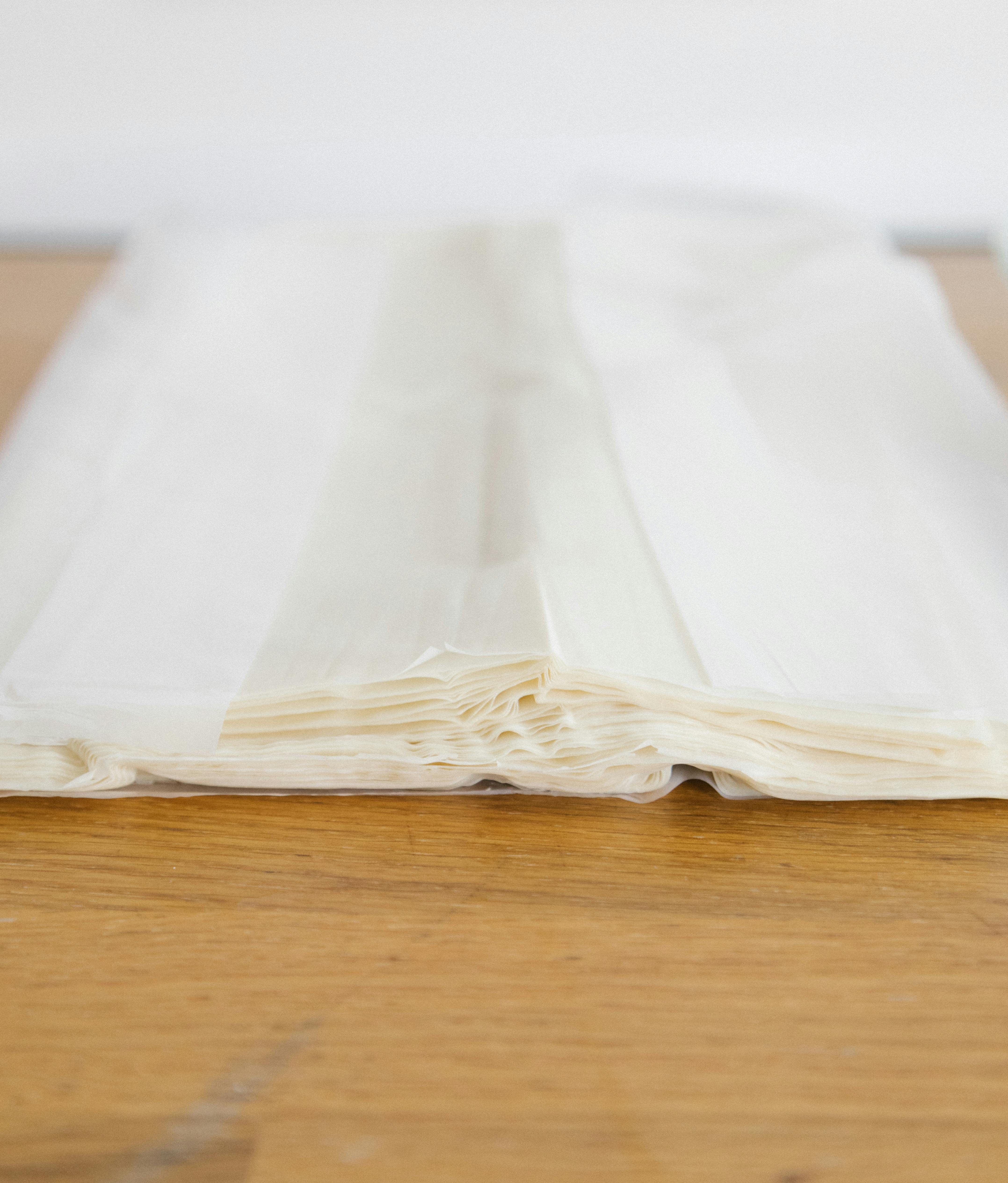 A Close-Up Shot of a Stack of Phyllo Dough · Free Stock Photo