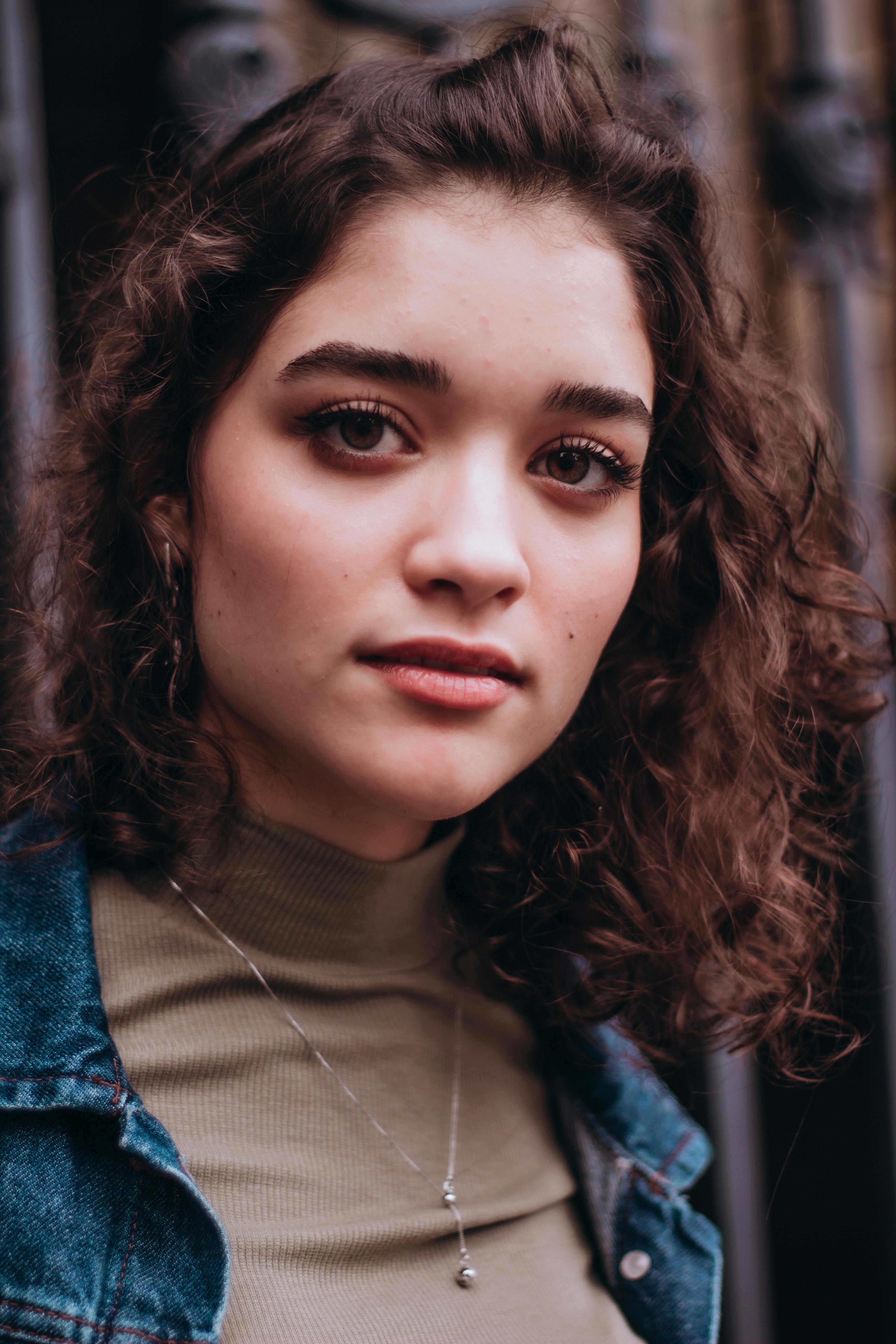 Portrait of a Woman in Dim Light · Free Stock Photo