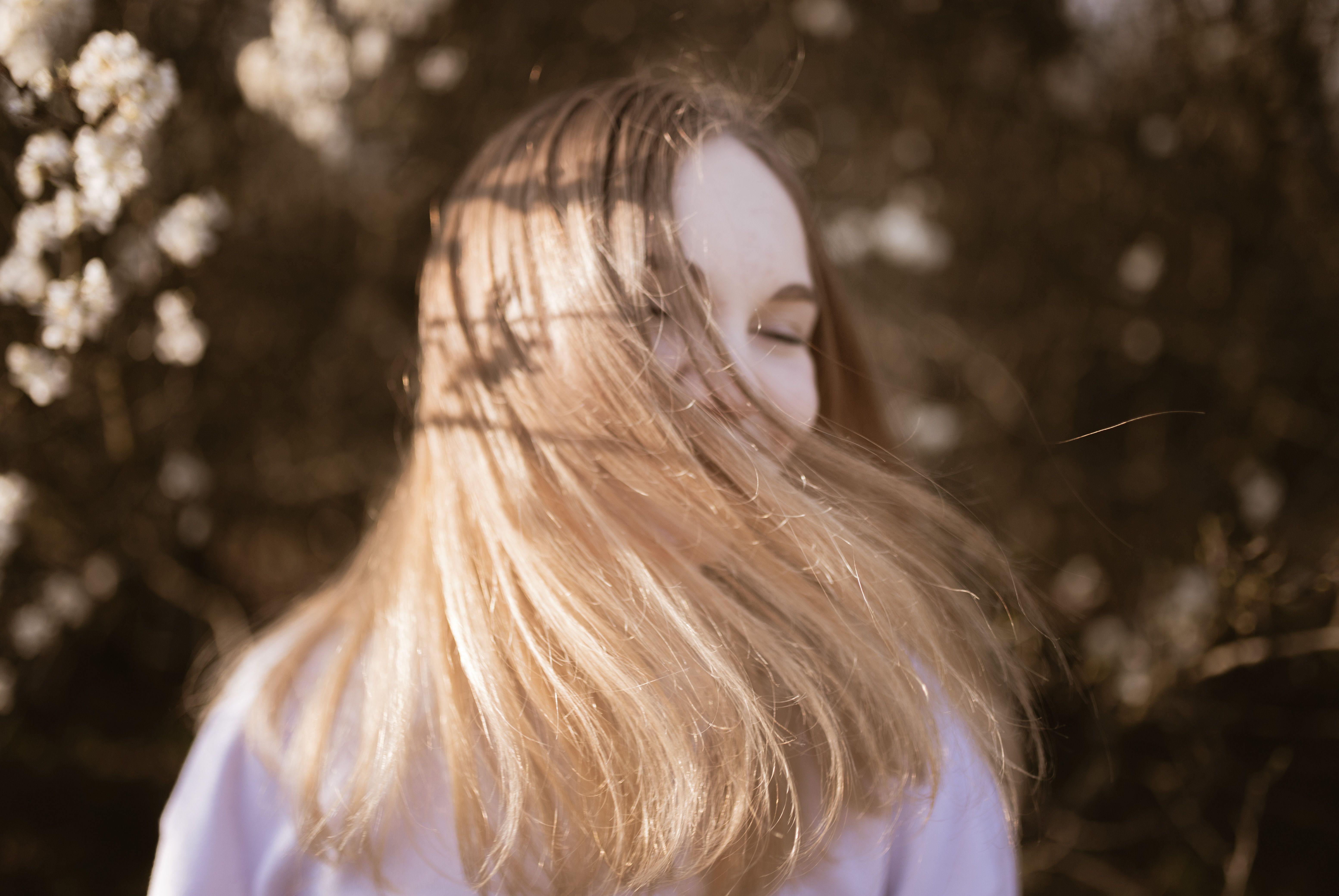 Close-Up Photo of a Beautiful Woman Looking Back · Free Stock Photo