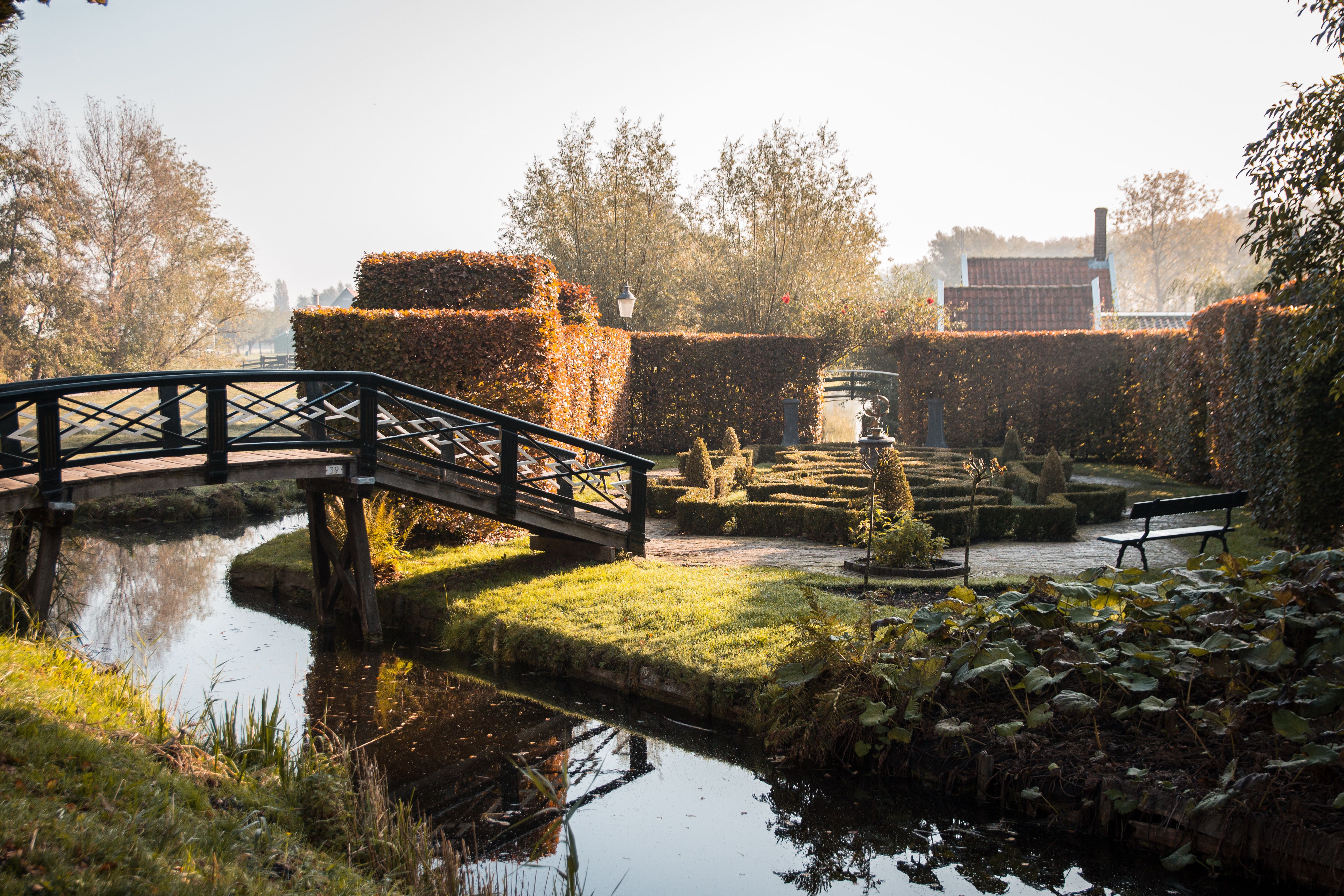 Brown Wooden Walk Bridge on a Garden · Free Stock Photo