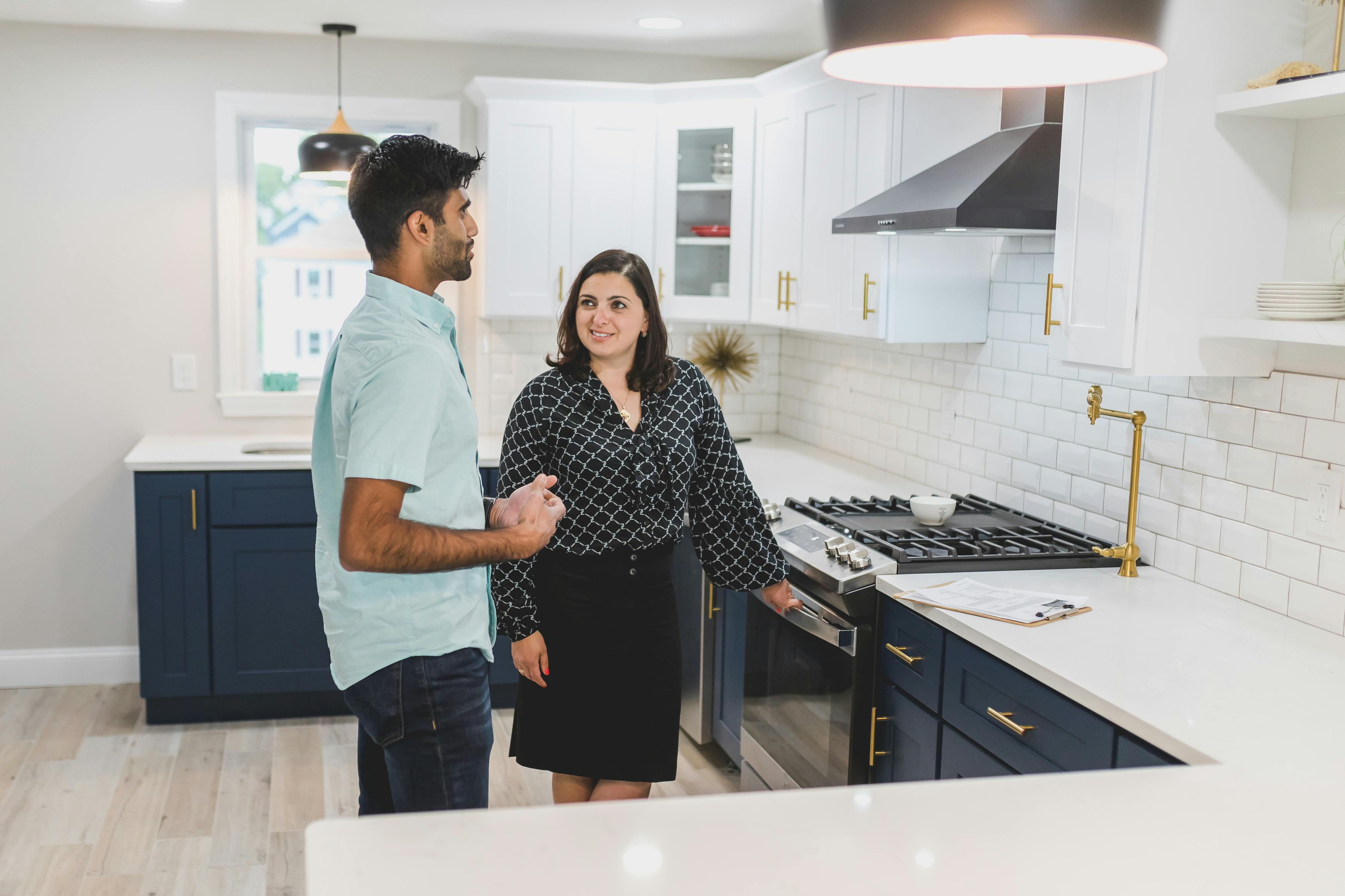 Two Women Having Conversation in the Kitchen · Free Stock Photo