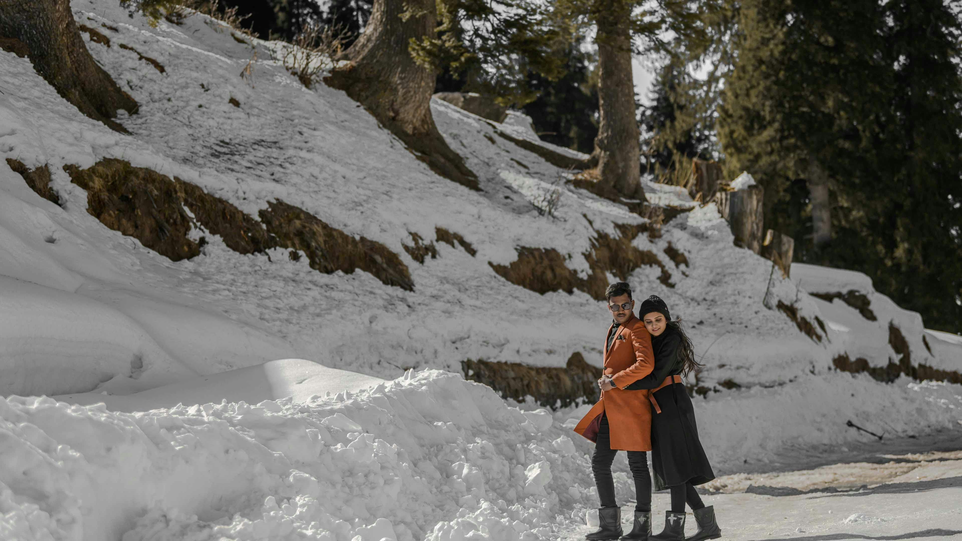 Man and Woman Sitting Beside a Bonfire · Free Stock Photo