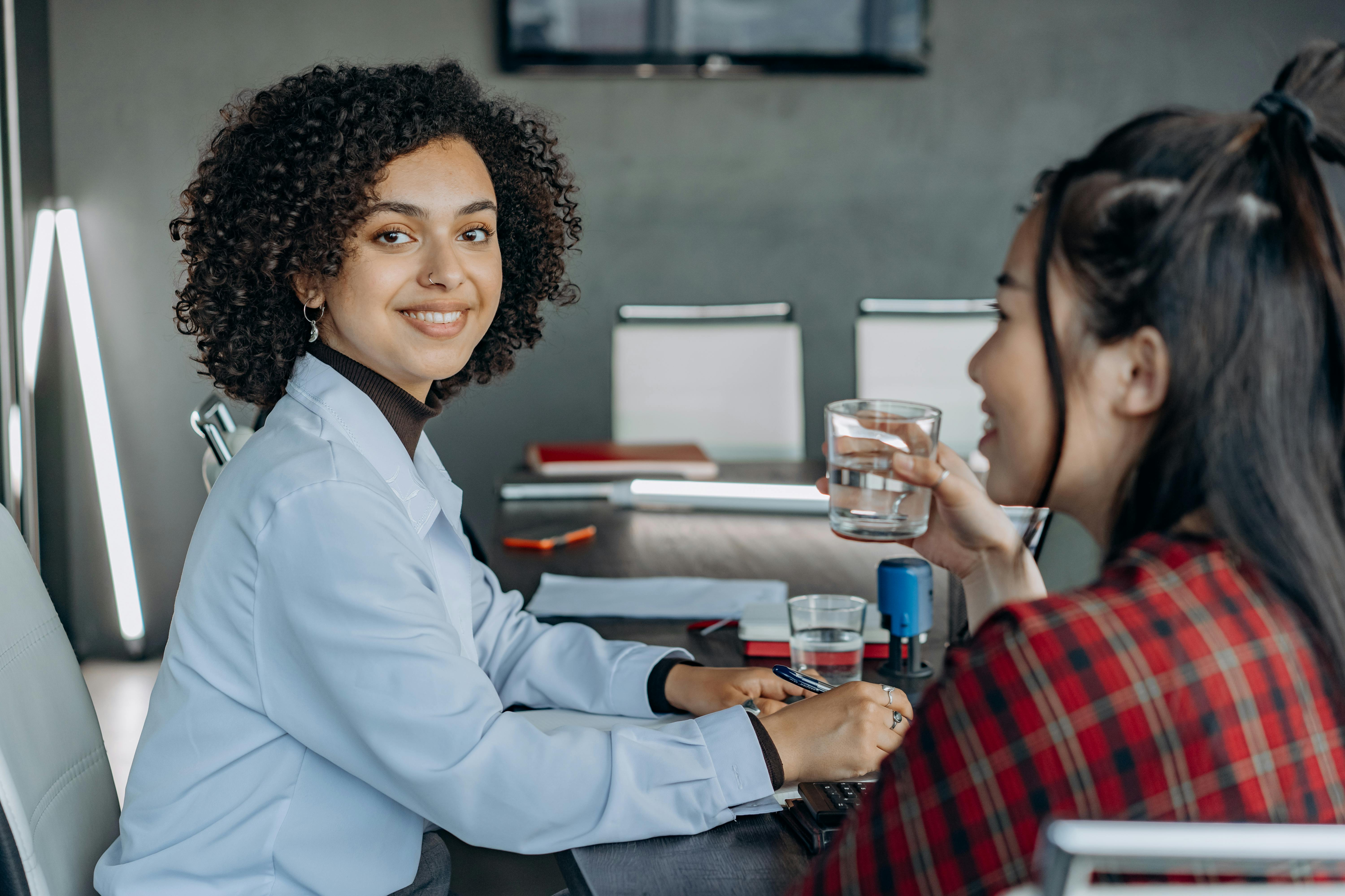 Women in a Conference Room · Free Stock Photo