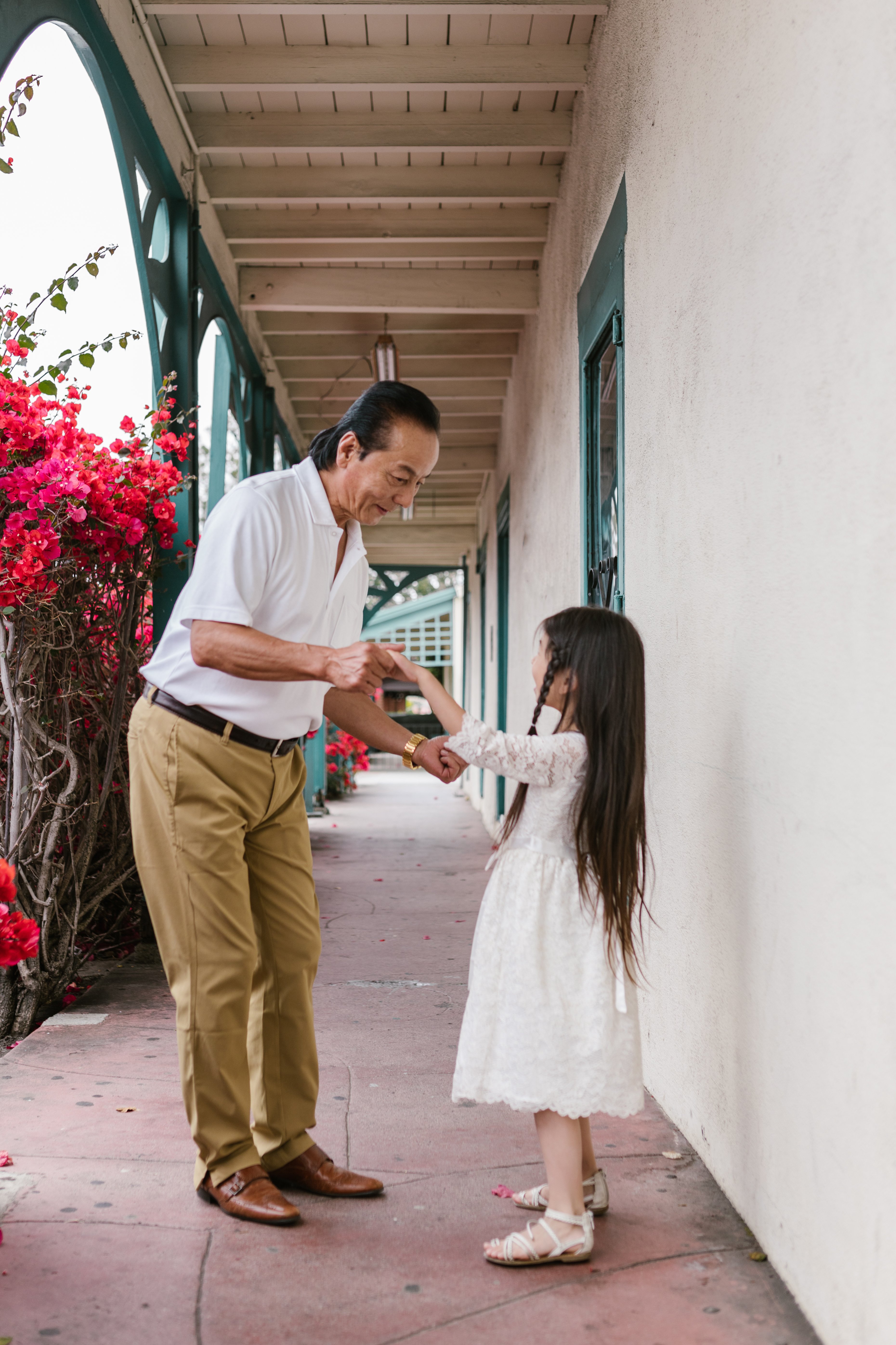 Photo of a Father Walking with His Daughter · Free Stock Photo