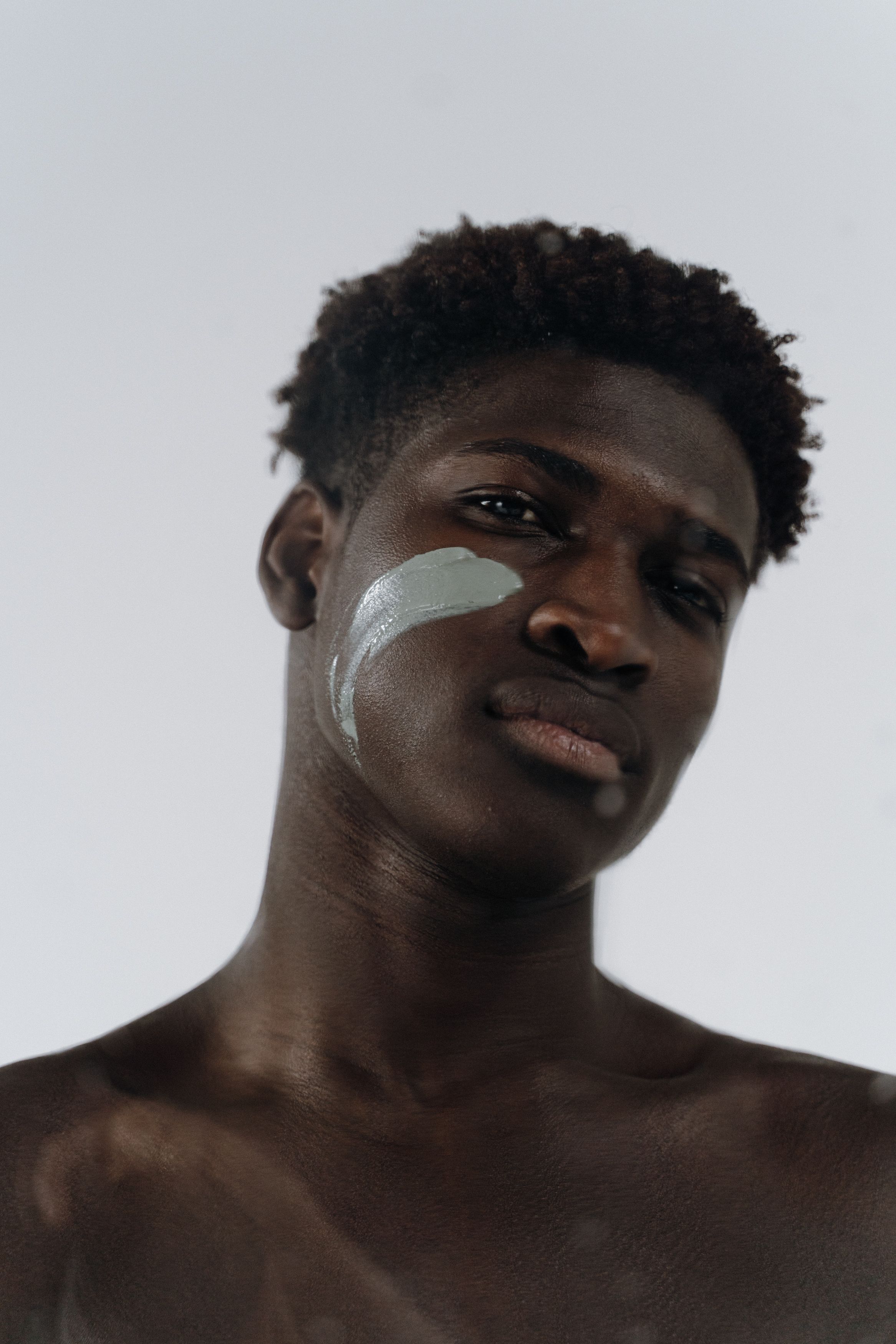 Handsome Man with Cream on Cheek · Free Stock Photo