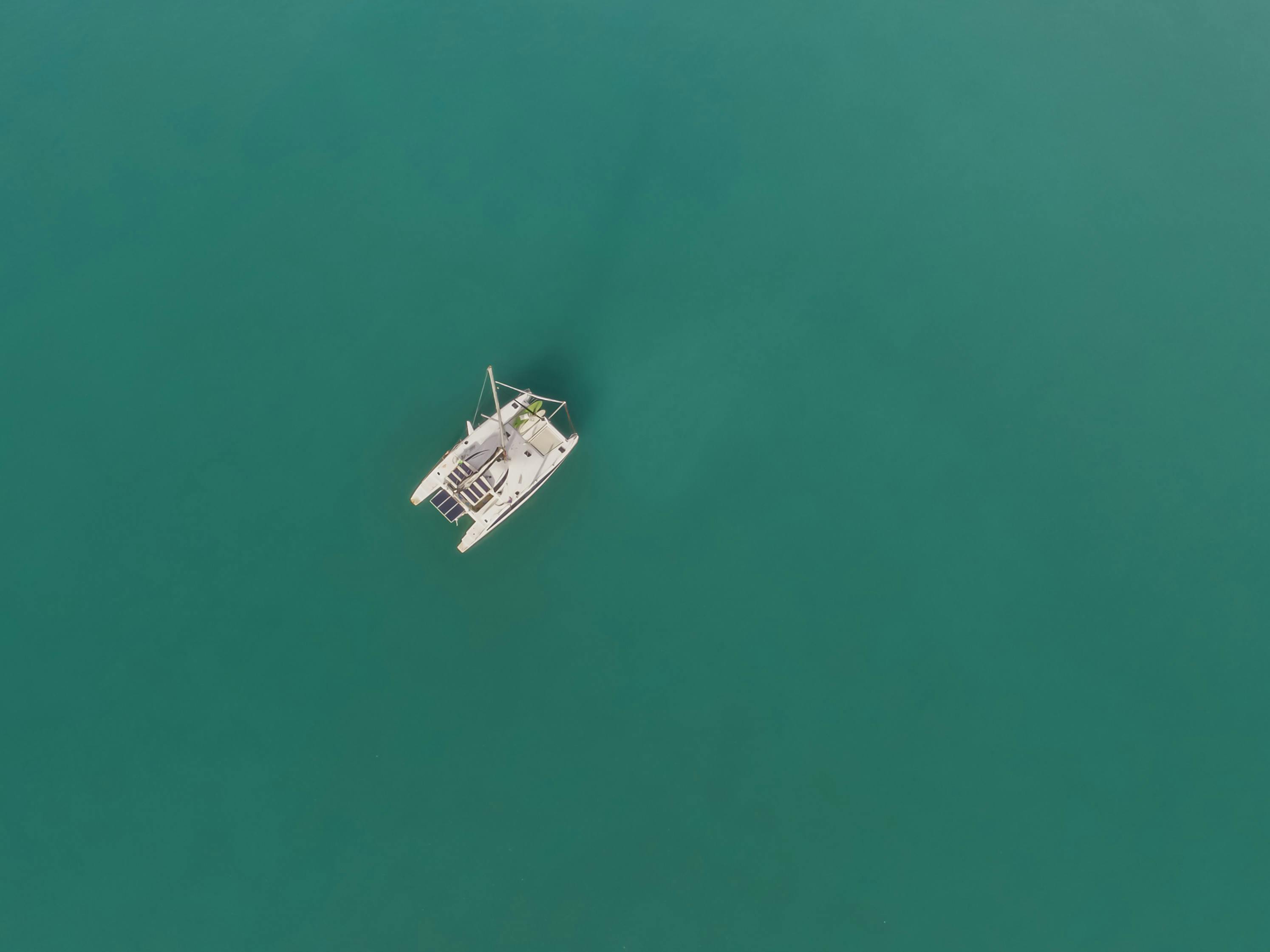An Aerial Photography of a Boat on the Sea · Free Stock Photo