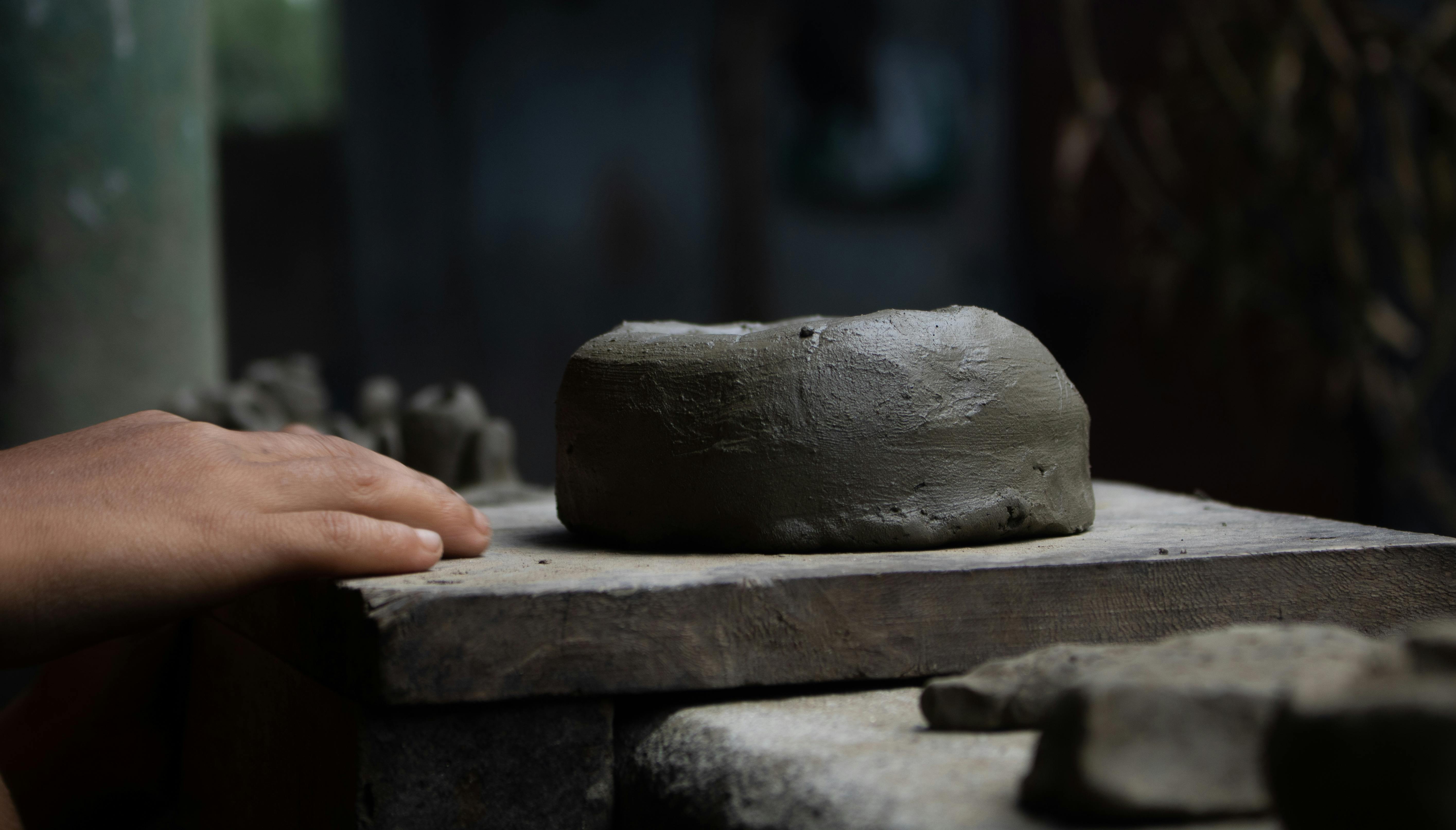 Hand and Clay Form · Free Stock Photo