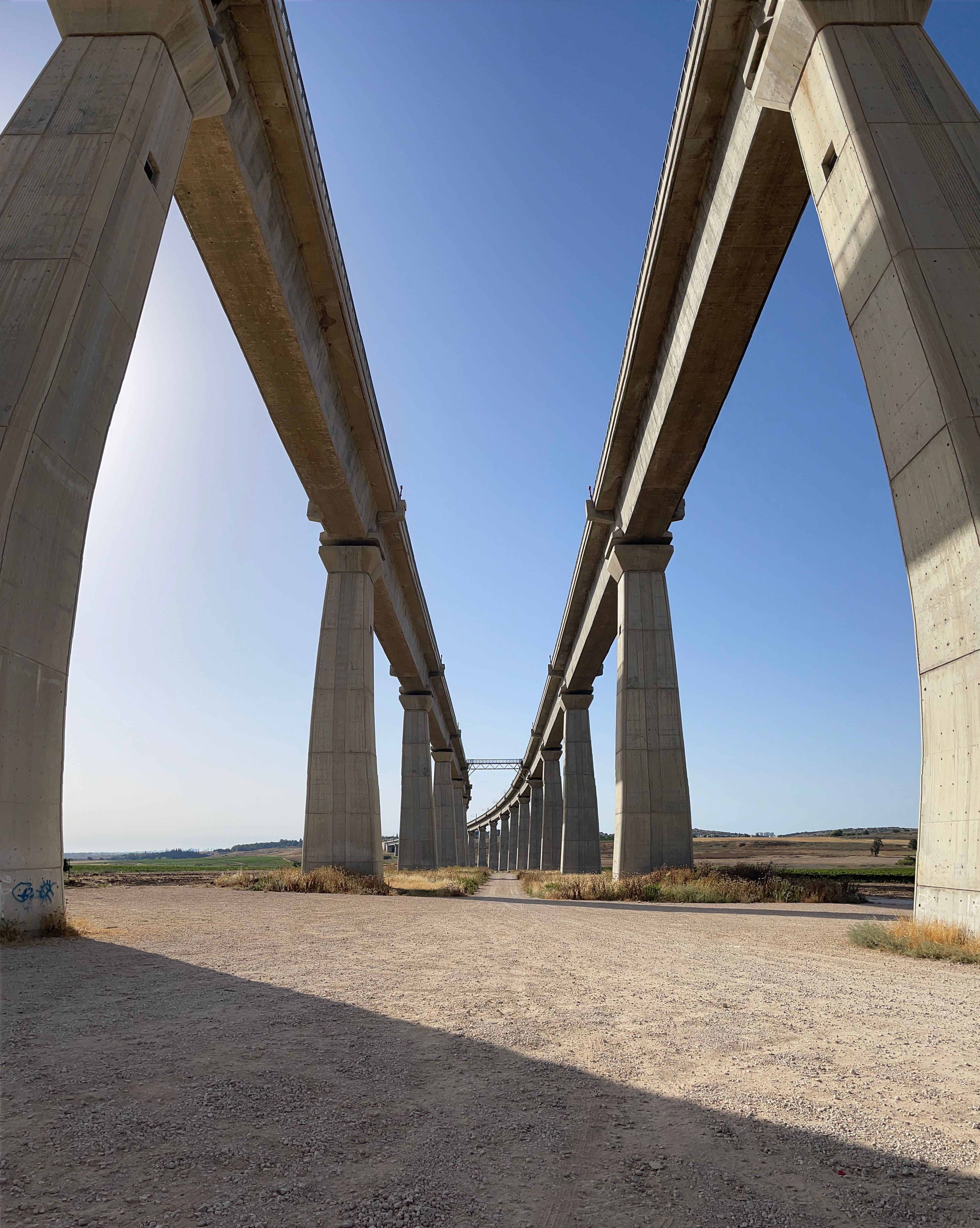 Concrete Train Bridges Under the Blue Sky · Free Stock Photo
