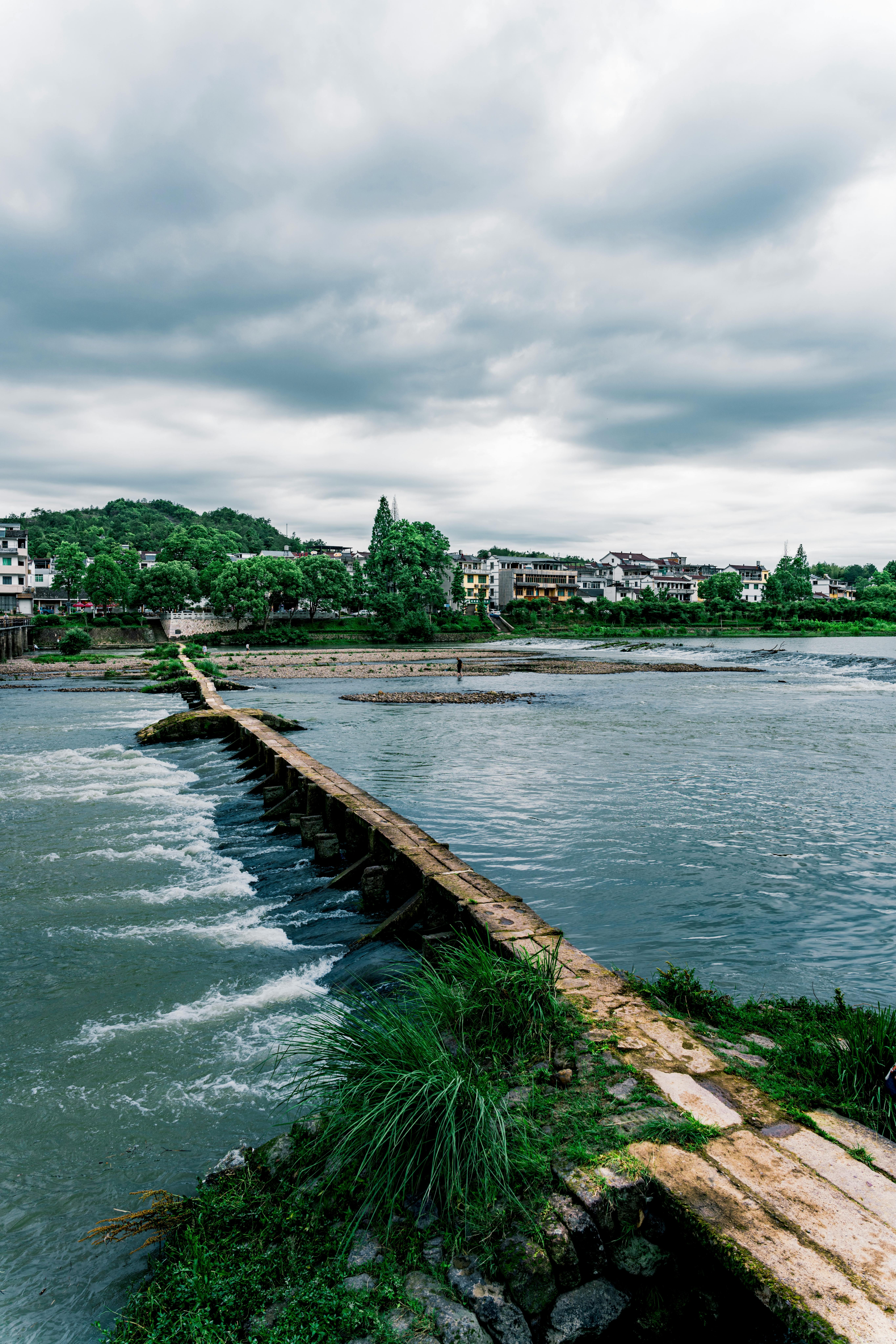 Stone Dam on River · Free Stock Photo