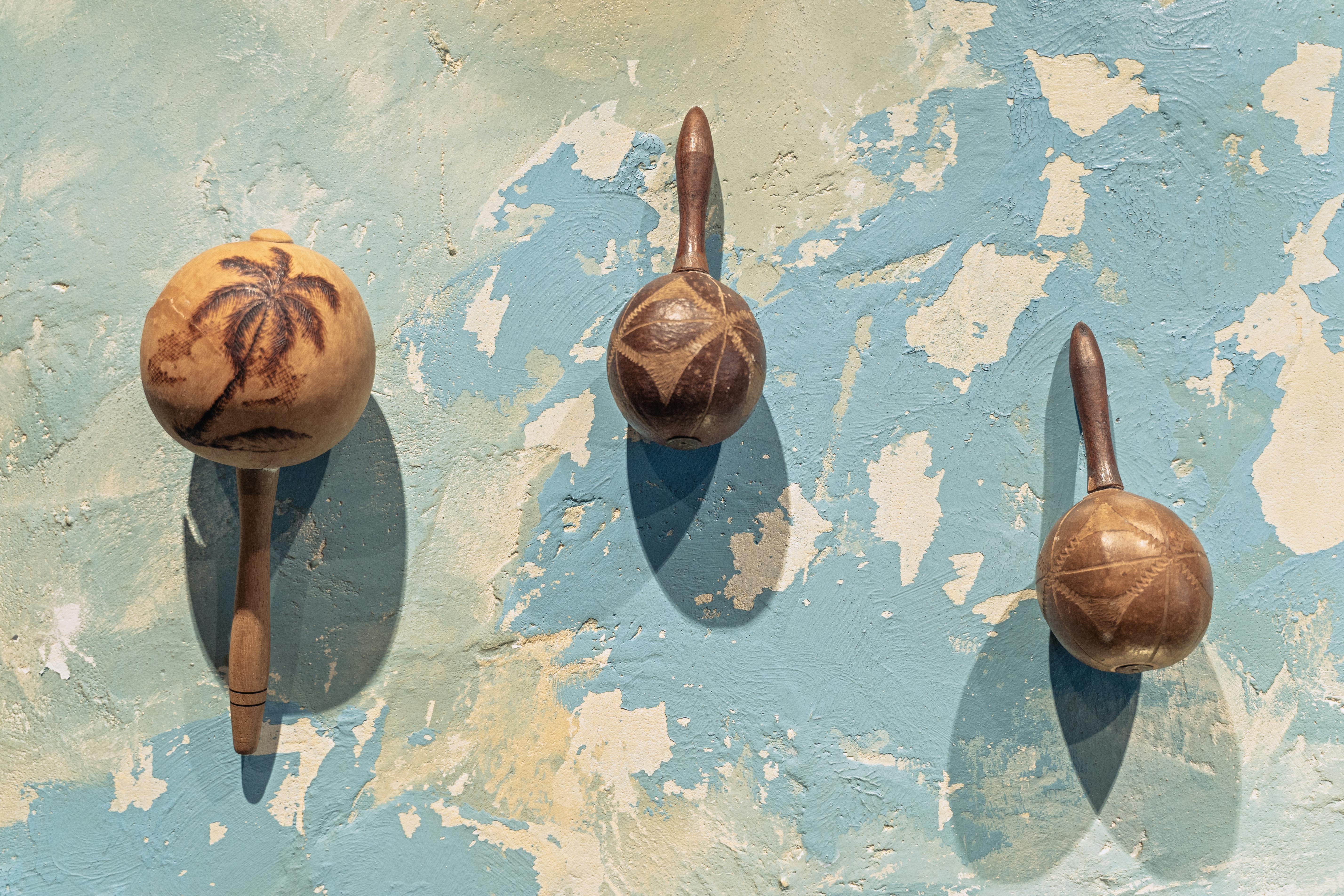 Maracas Against Scraped Wall · Free Stock Photo