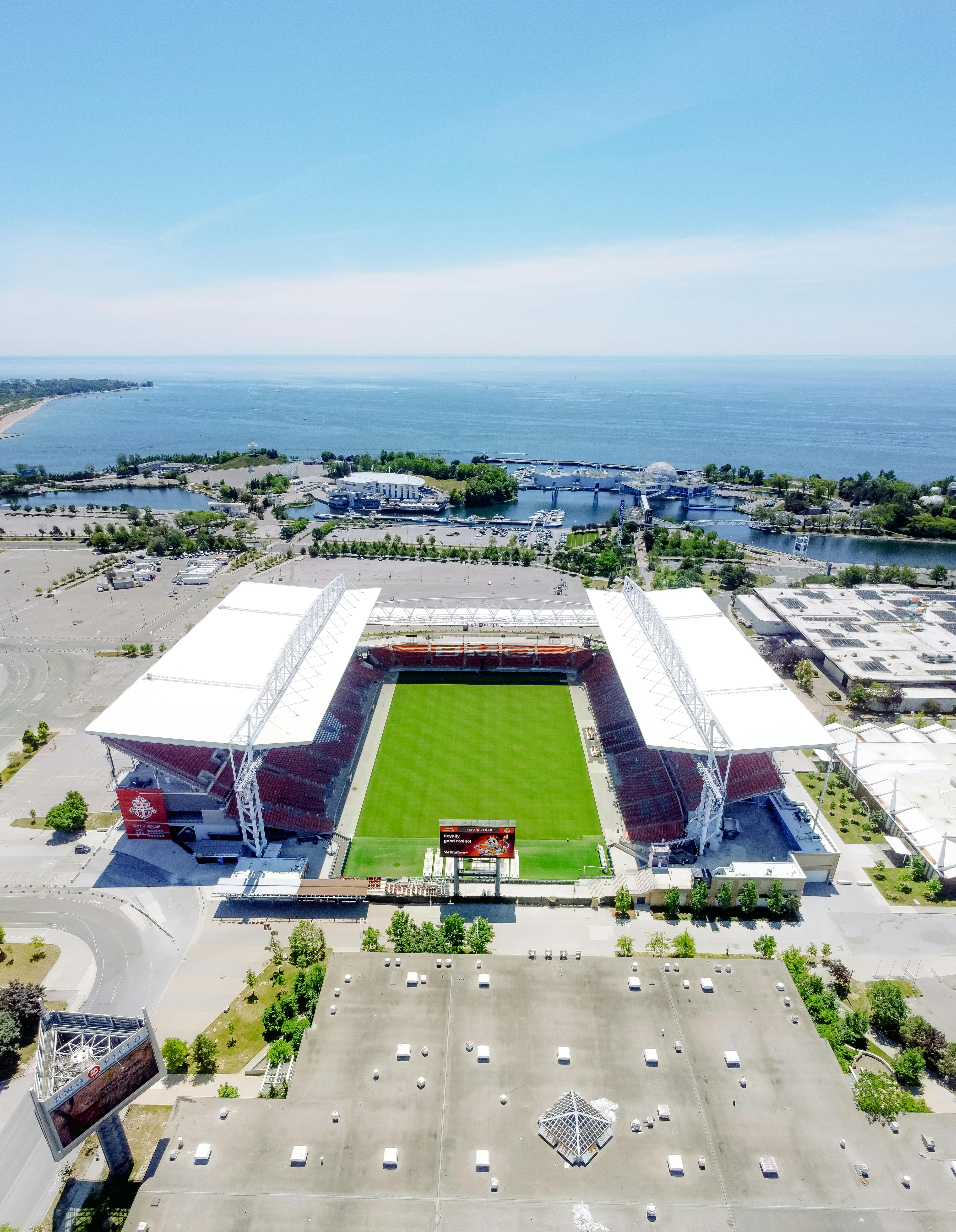 Symmetrical View of a Rectangle Shape Stadium on a Coast · Free Stock Photo