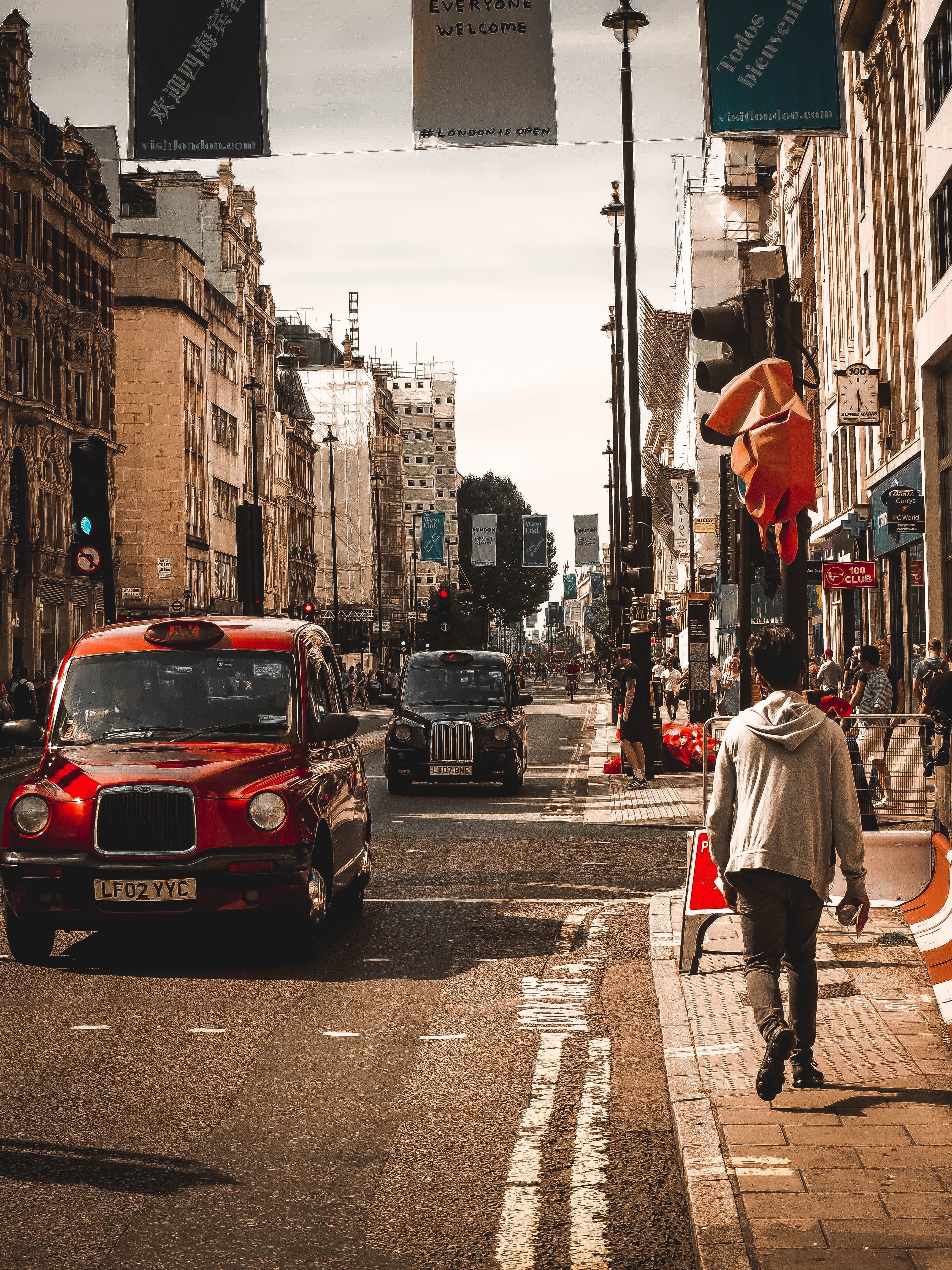 People Walking on the Sidewalk Near the Road with Moving Cars · Free ...