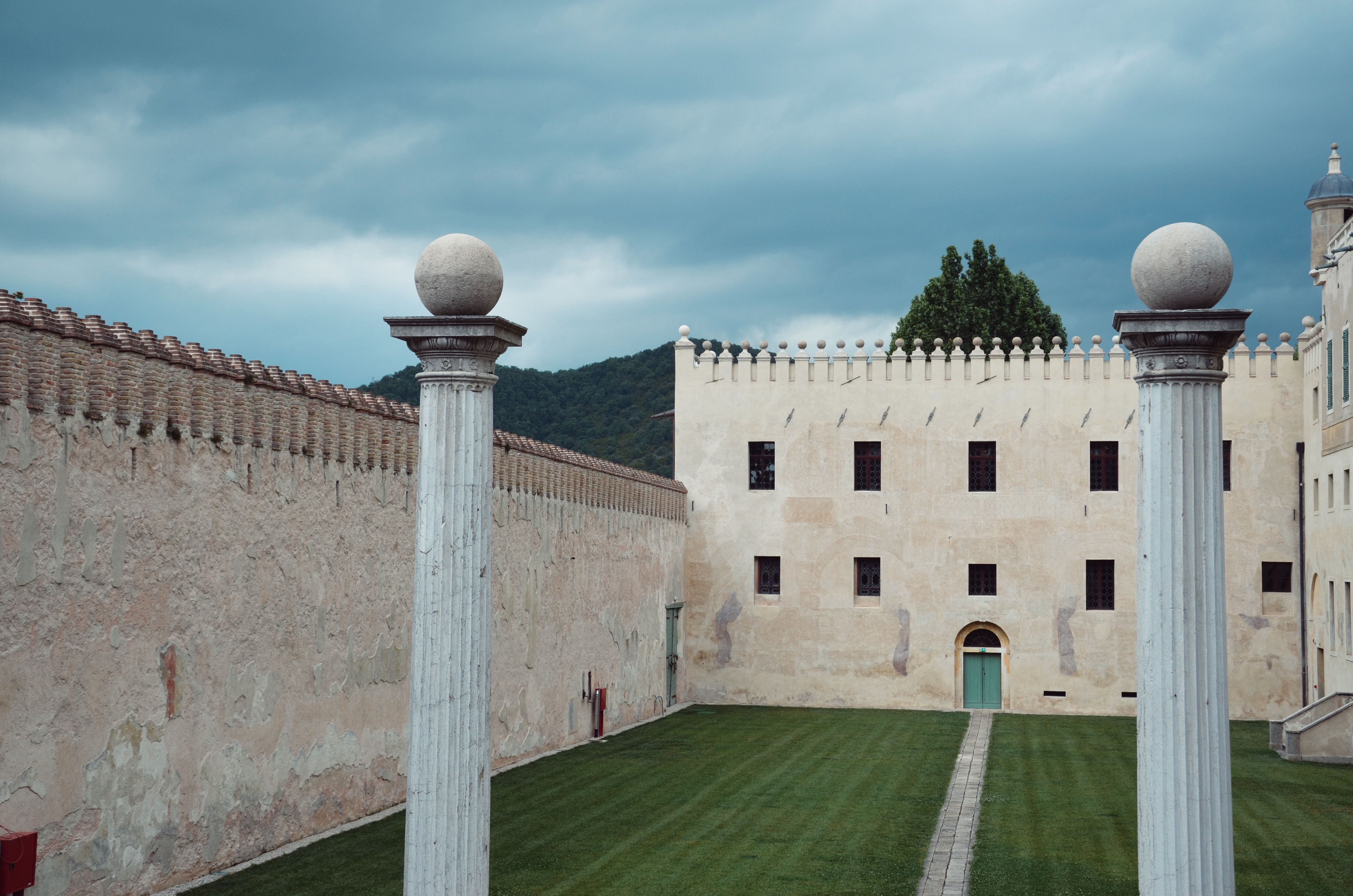 Heritage Building Decorative Walls and Green Lawn on Patio · Free Stock ...
