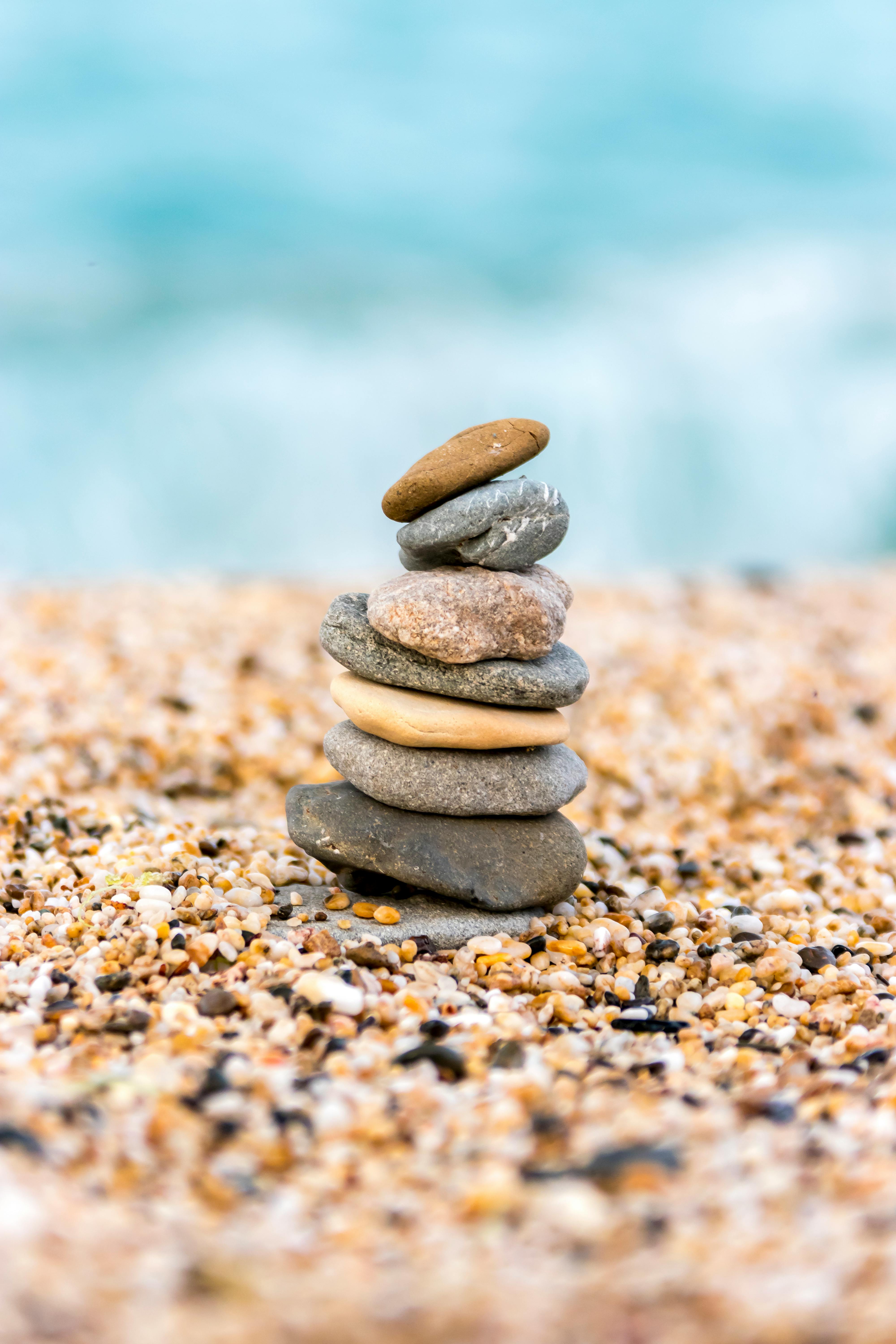 Stack of Stones on Brown and Black Pebbles · Free Stock Photo