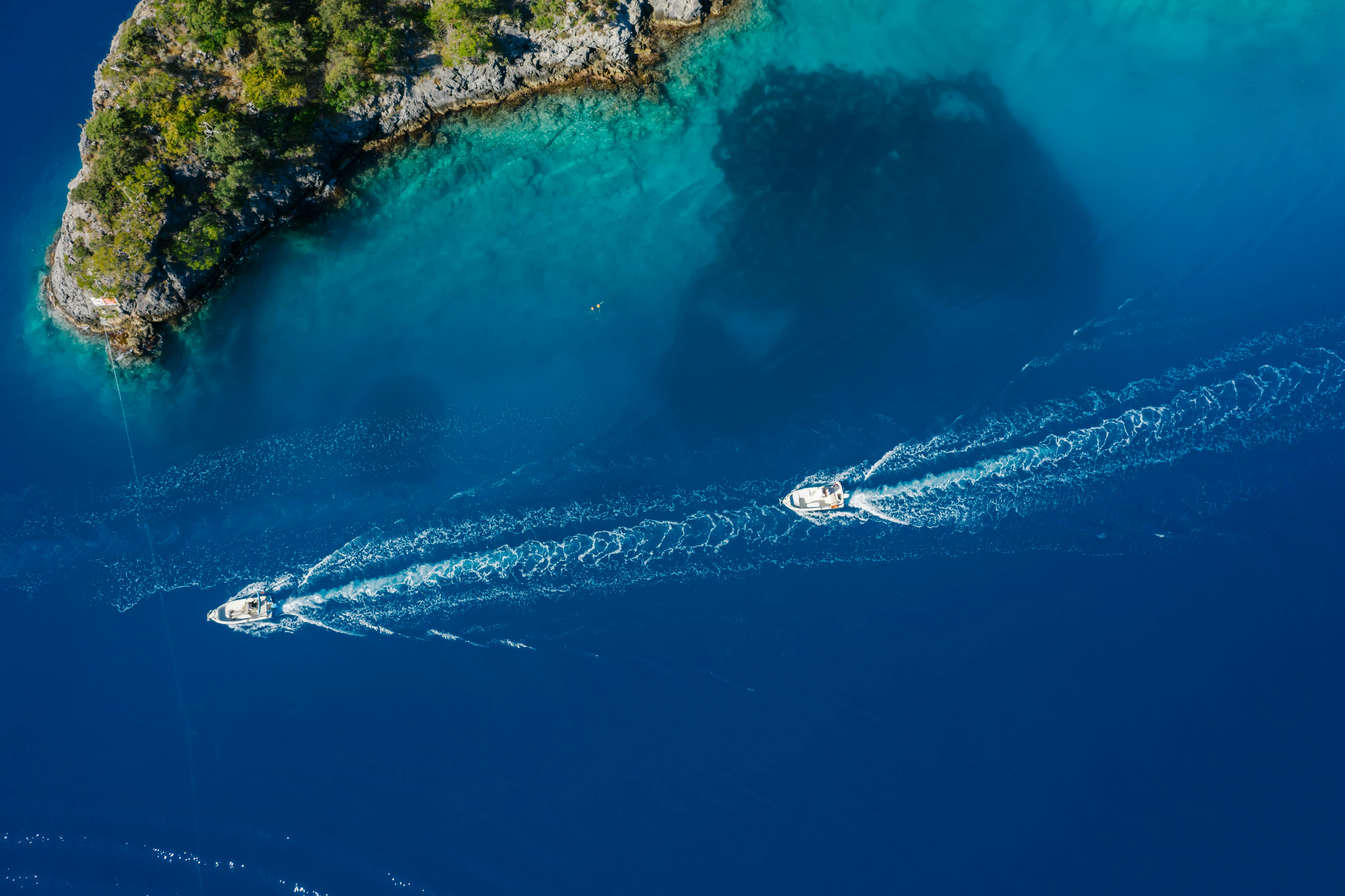 Aerial View of Boats on Sea and Coastline · Free Stock Photo