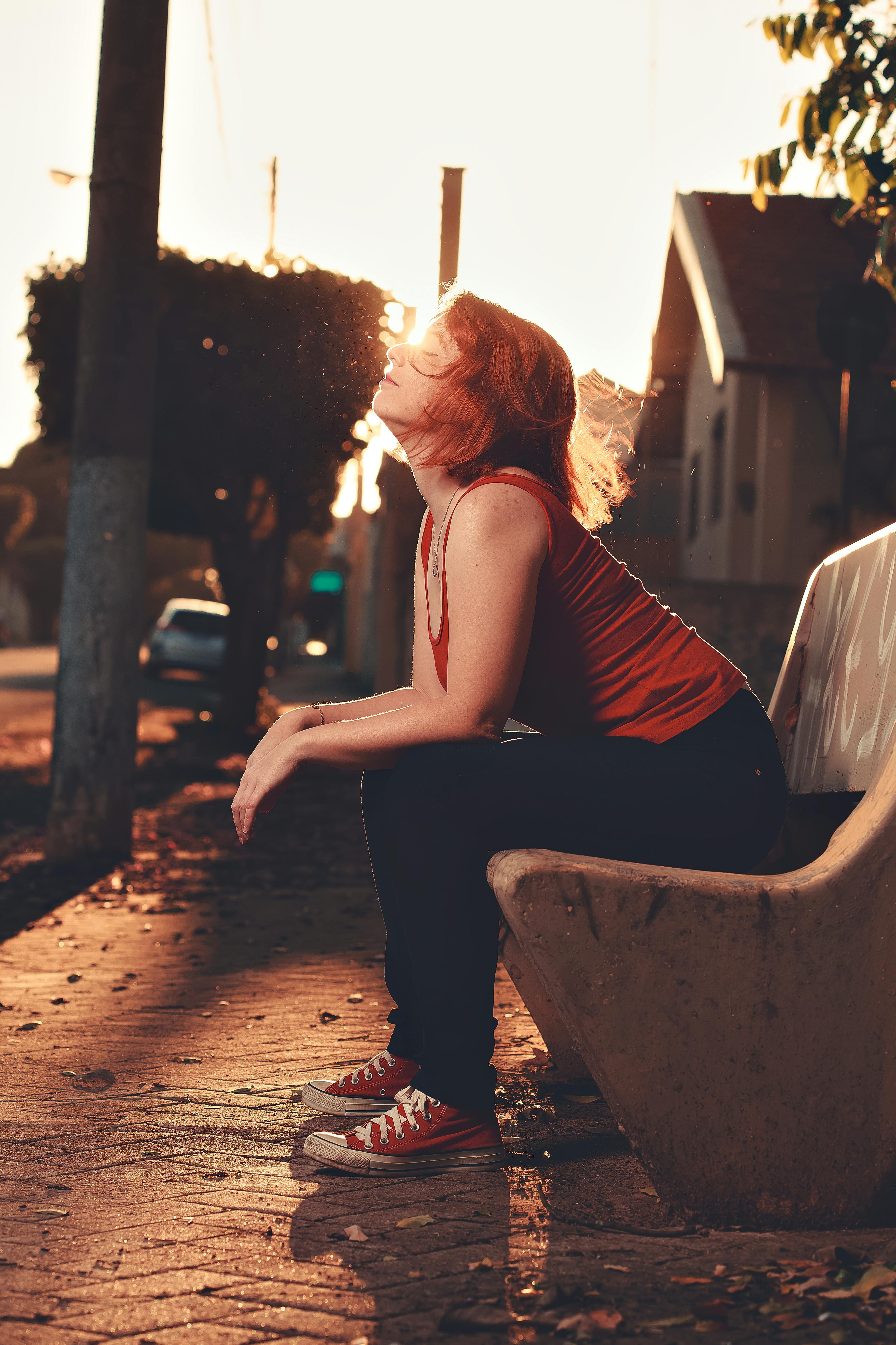 Woman in Bikini Sitting in Sunlight · Free Stock Photo