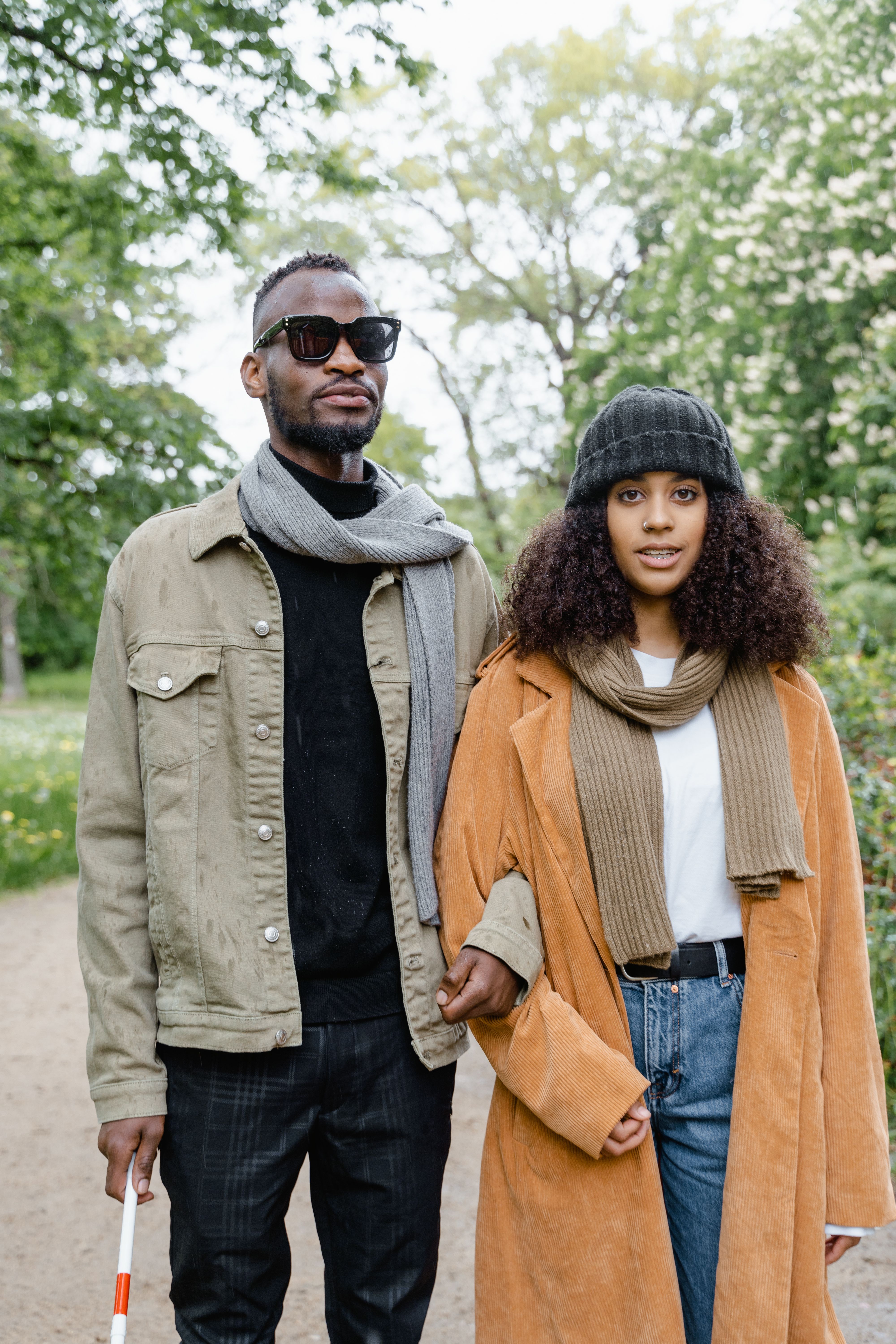A Blind Man Standing with a Woman · Free Stock Photo