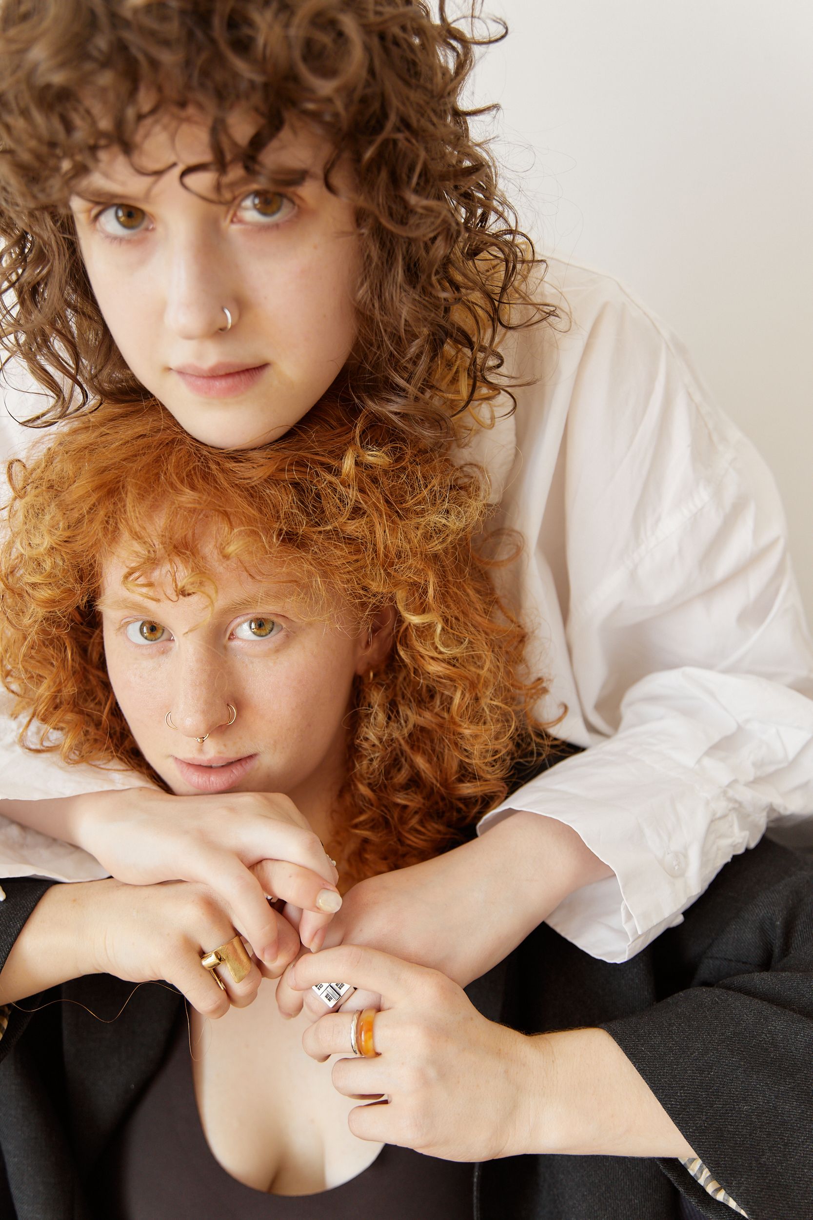 A Couple With Curly Hairs Hugging · Free Stock Photo