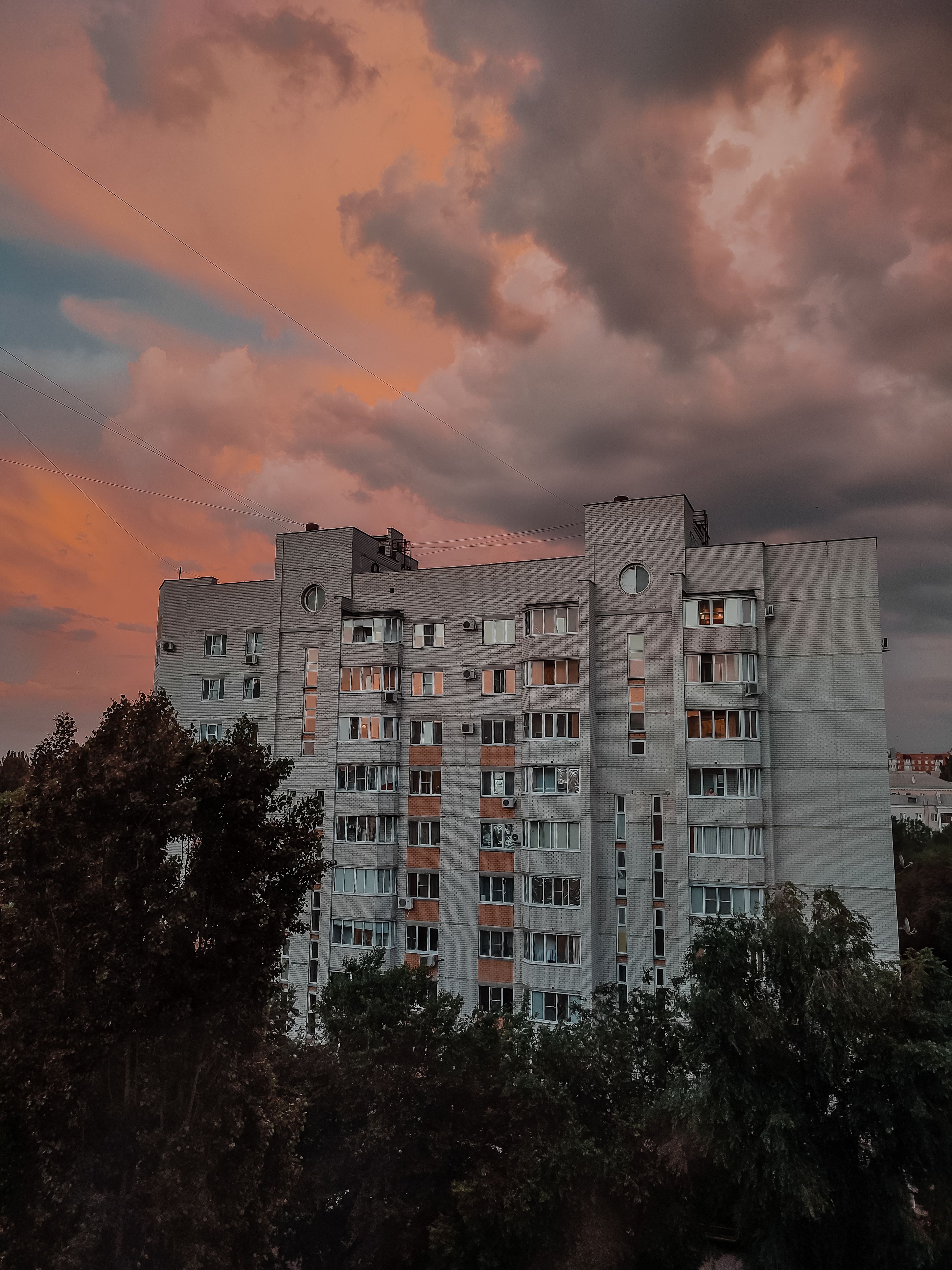 Tall Apartment Buildings in City at Sunset · Free Stock Photo