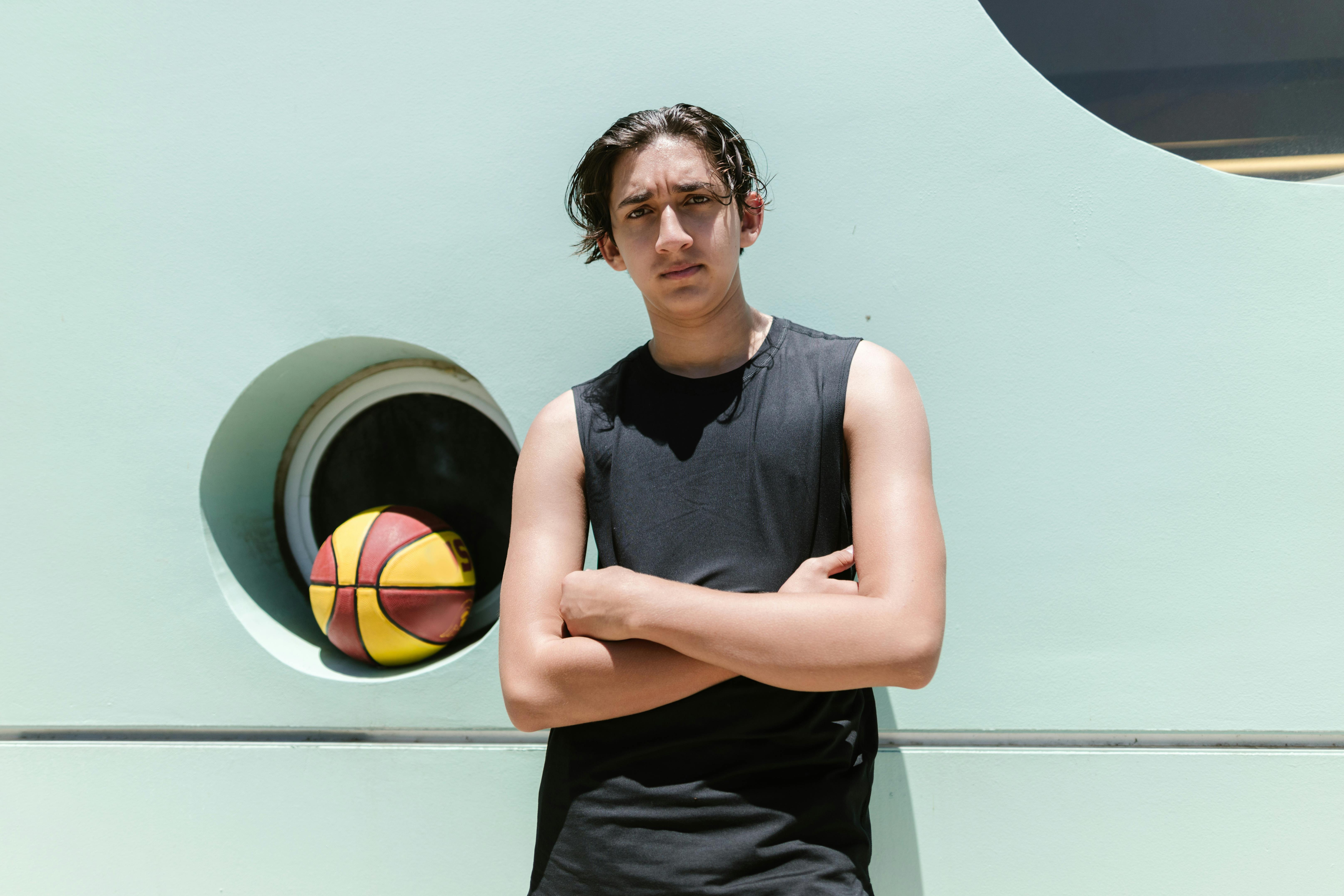 Person Leaning on a Wall · Free Stock Photo