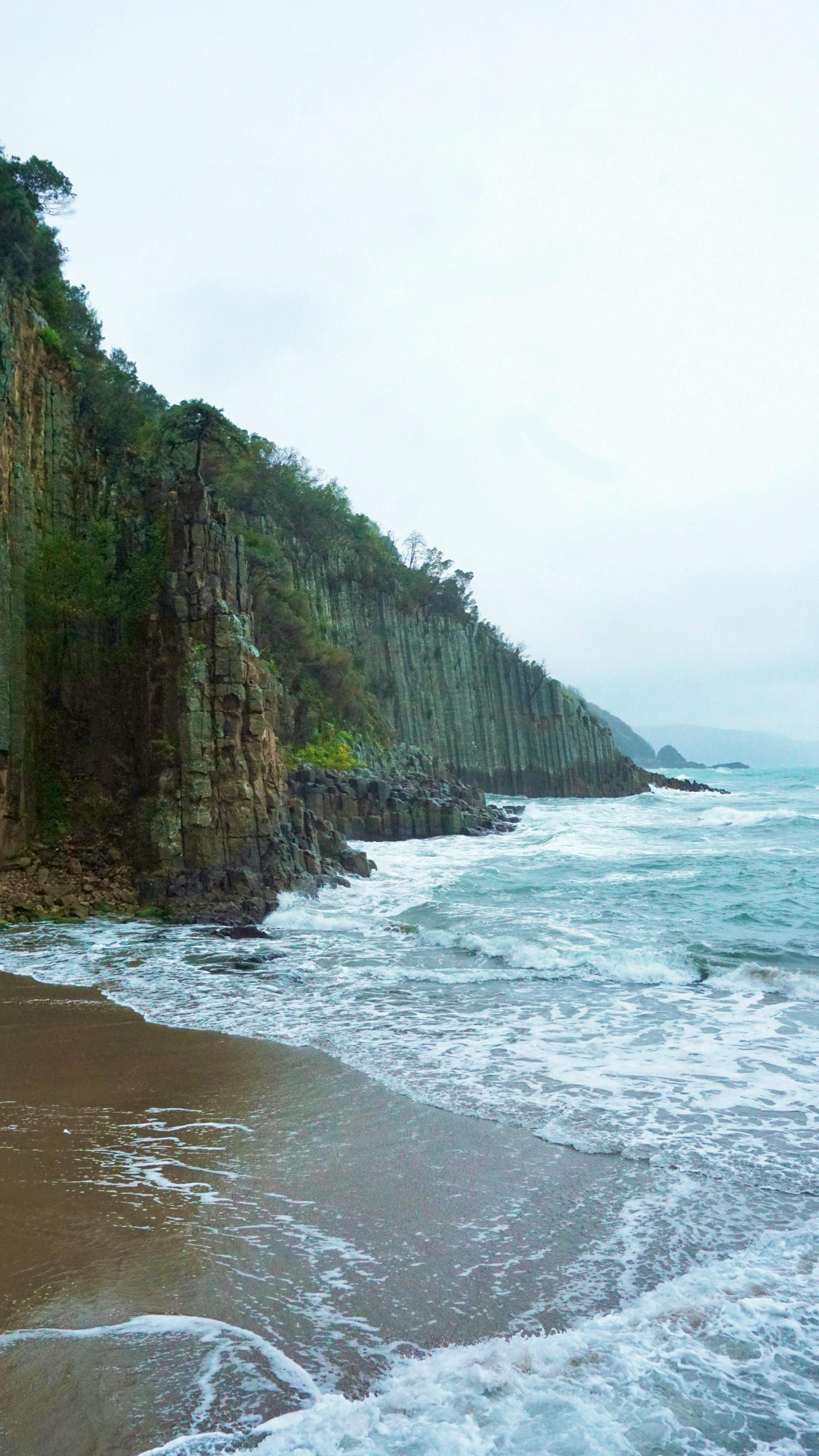 Bird's Eye View of Cliff over Cove · Free Stock Photo