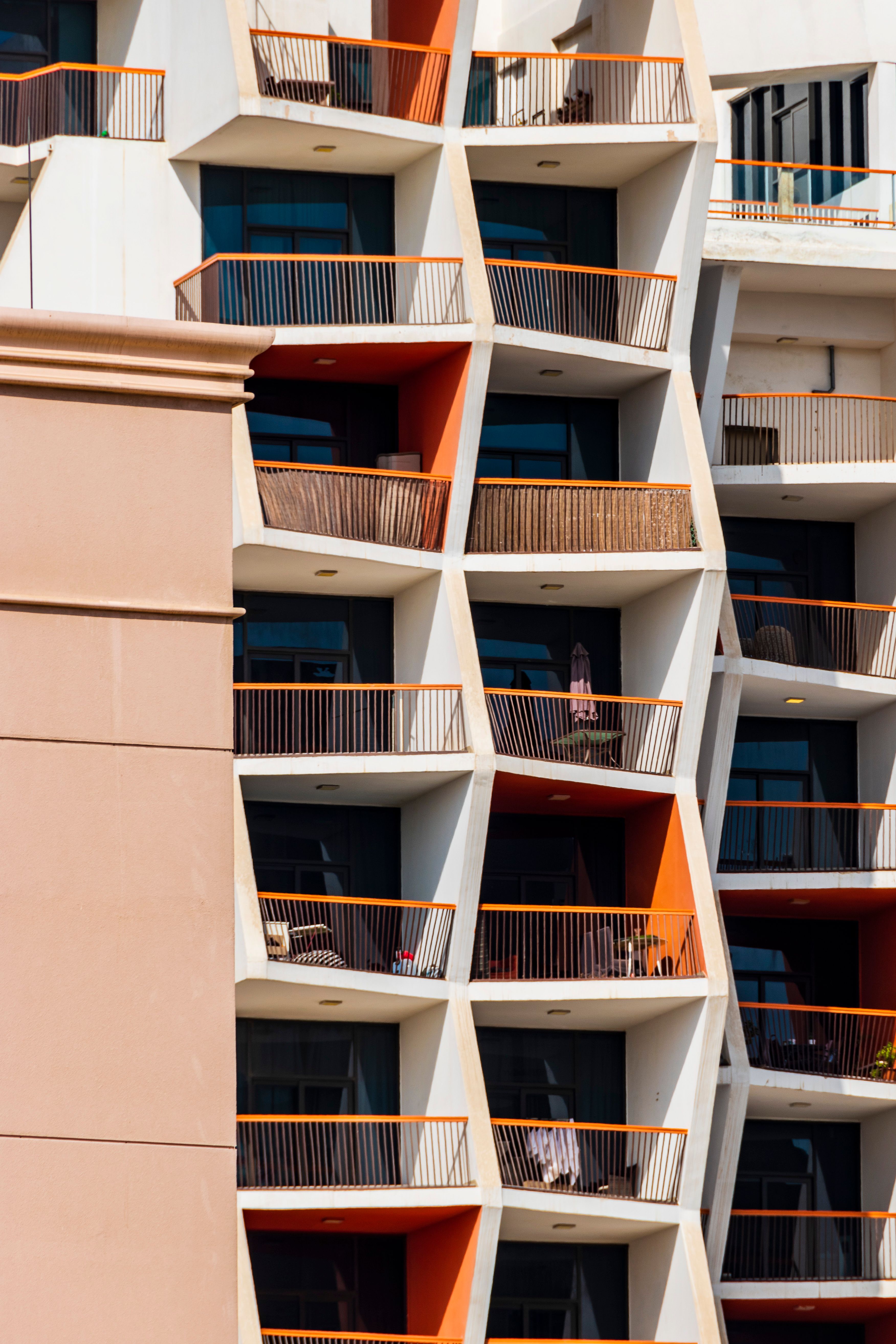Vertical Colorful Lines on a Residential Building · Free Stock Photo